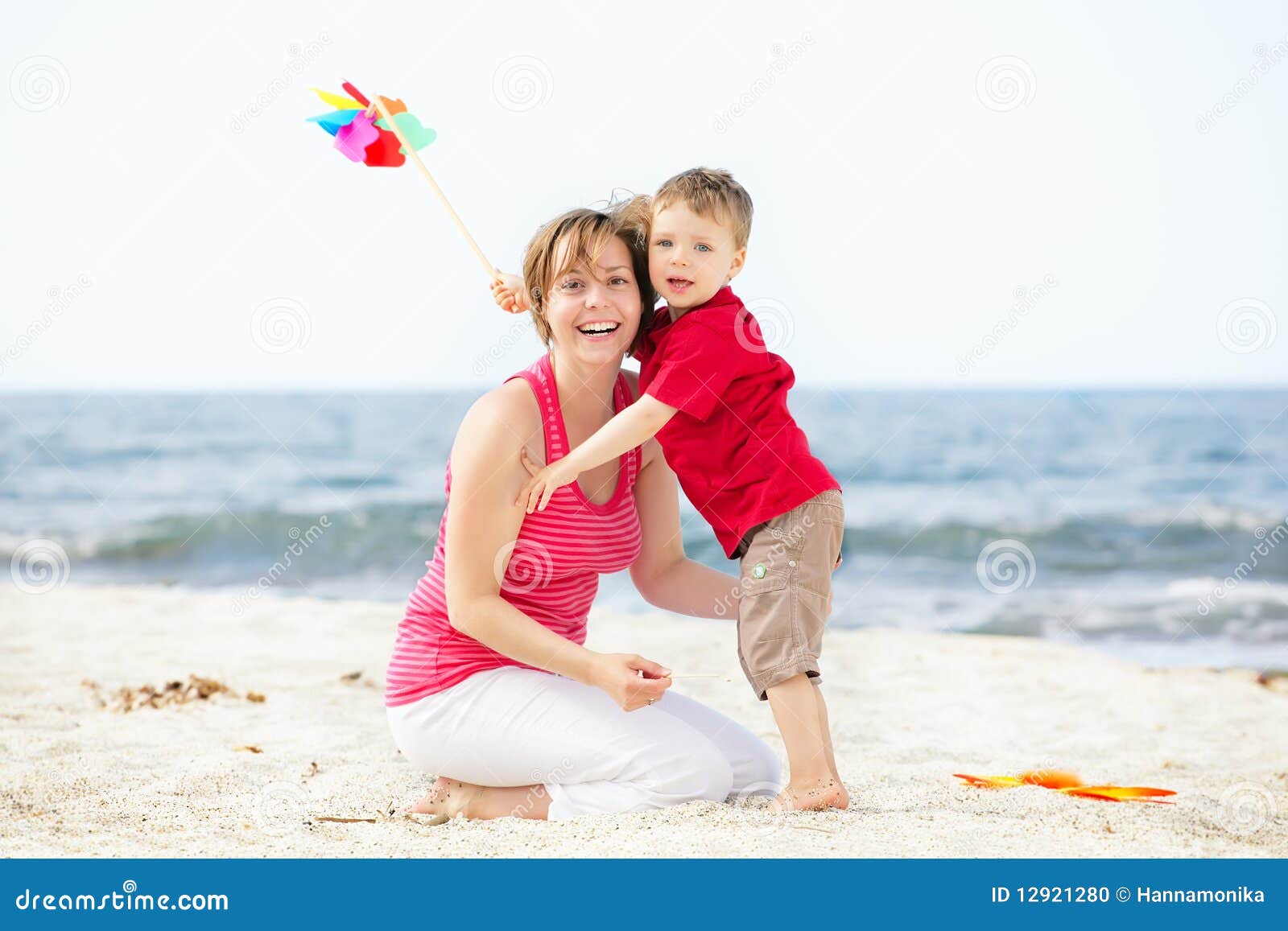 Mother and Son Having Fun on the Beach. Stock Photo - Image of color ...