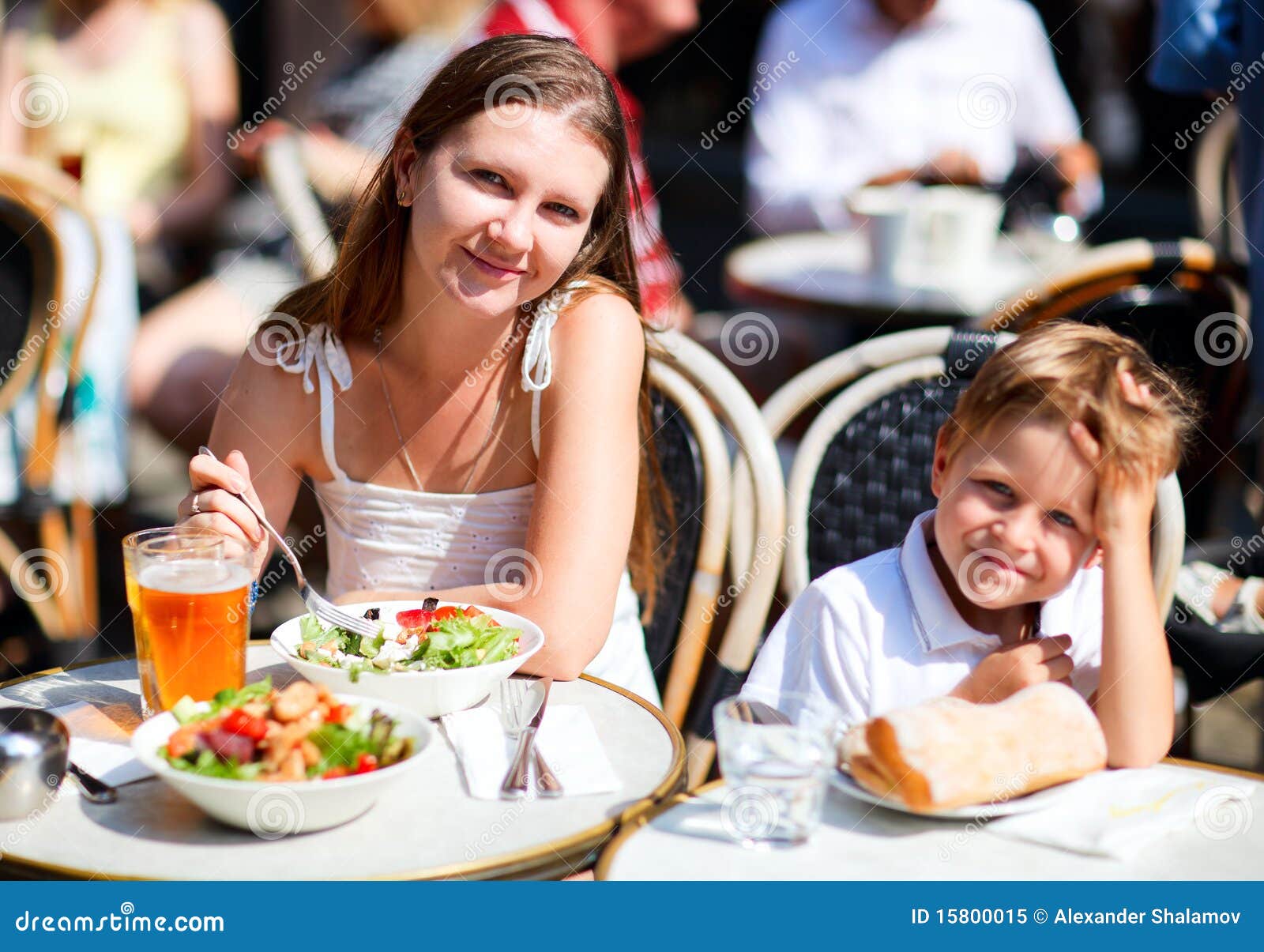 Mother and Son Having Lunch in Sidewalk Restaurant Stock Image - Image ...