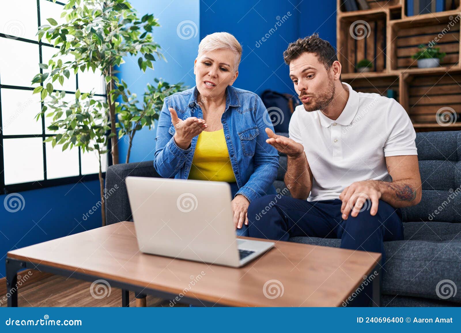Mother and Son Having Video Call Sitting on Sofa at Home Stock Photo ...