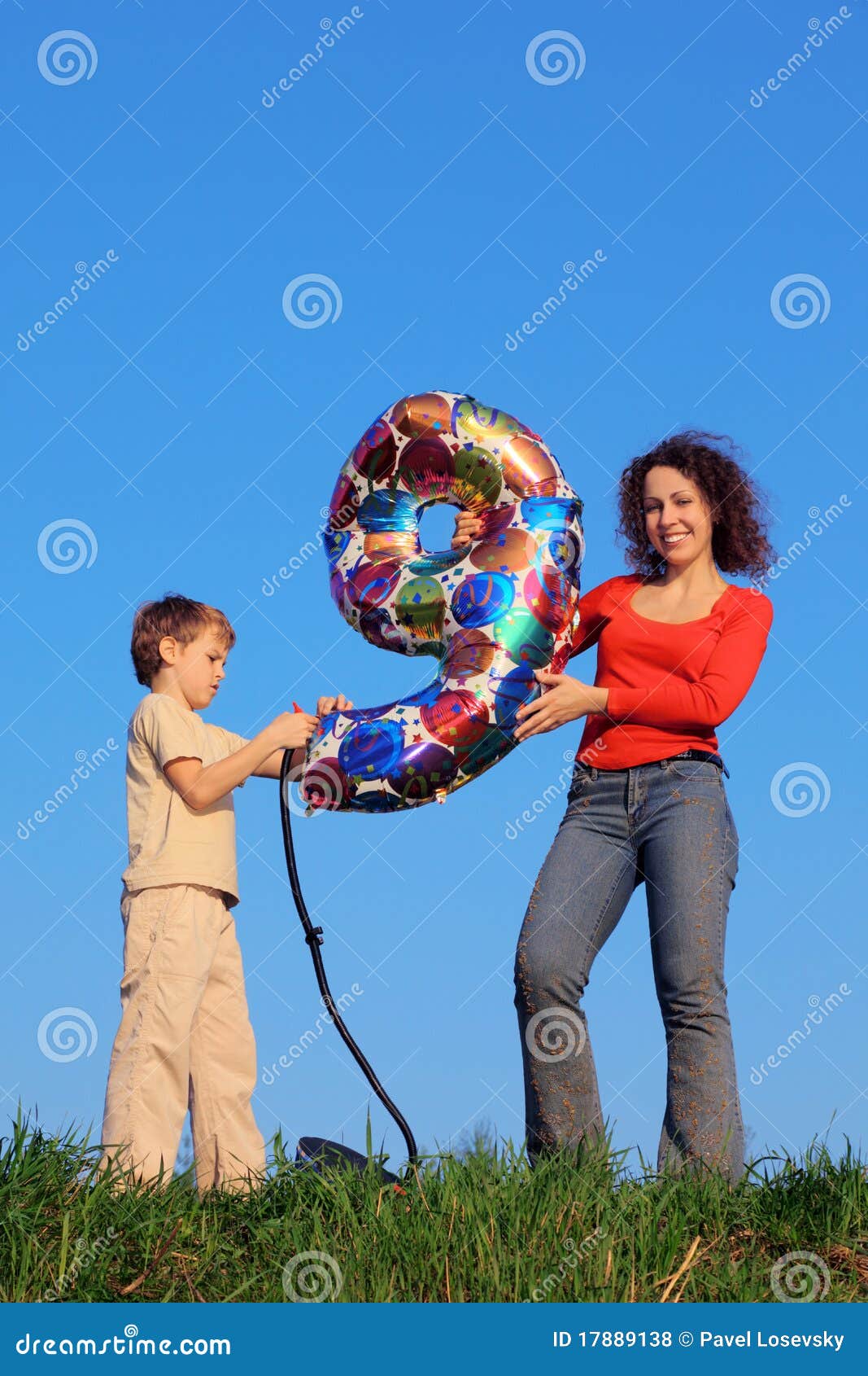 Mother and Son Holding an Figure of Nine Stock Photo - Image of number ...