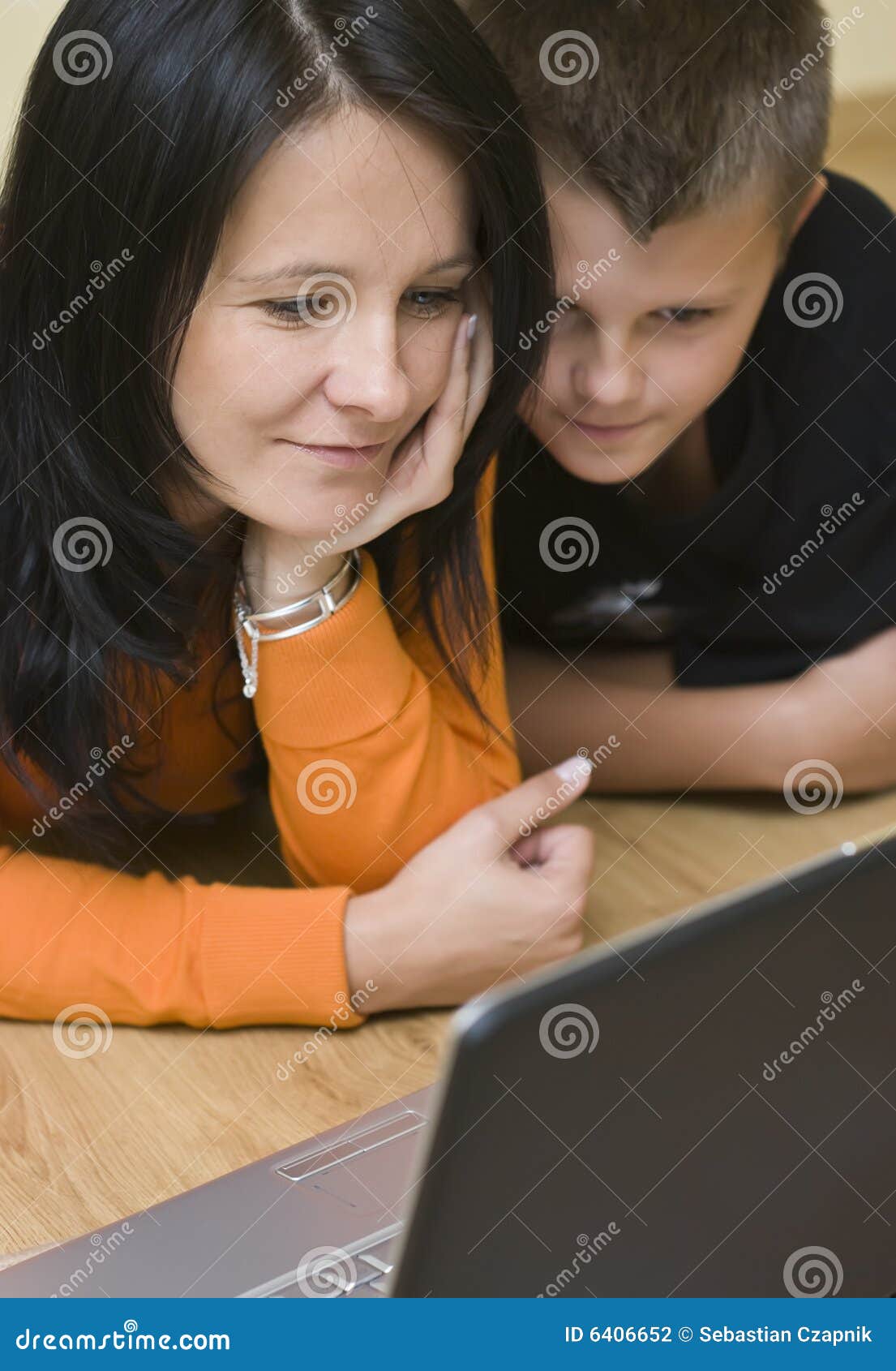 Mother and son with laptop stock photo. Image of teenager - 6406652