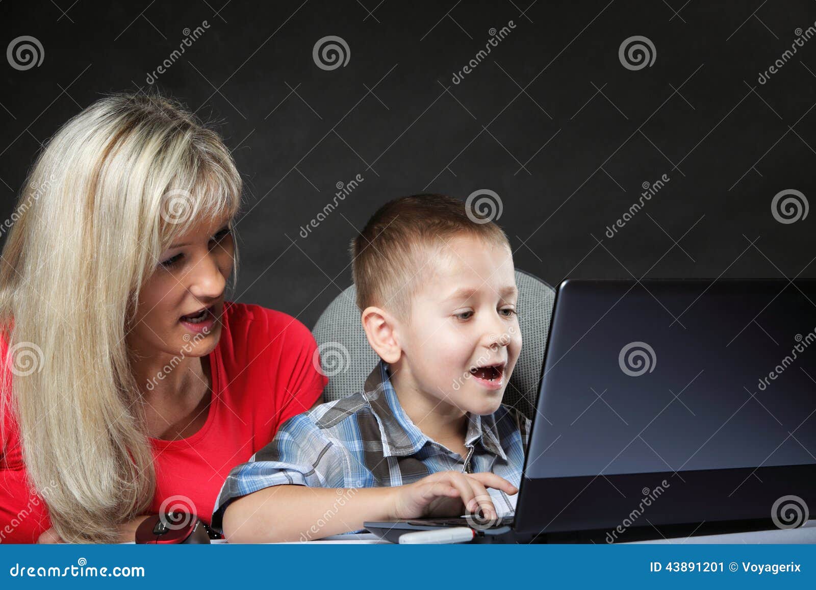 Mother with Son Looking on the Laptop Stock Image - Image of child ...