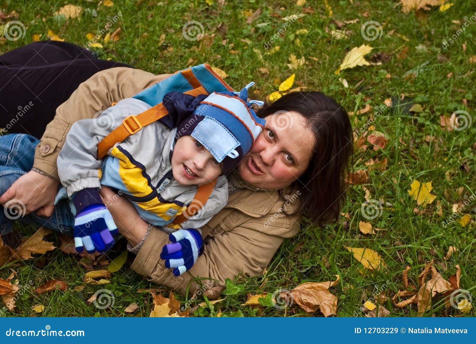 Mother And Son Lying On Grass Stock Image Image Of Nature Happiness