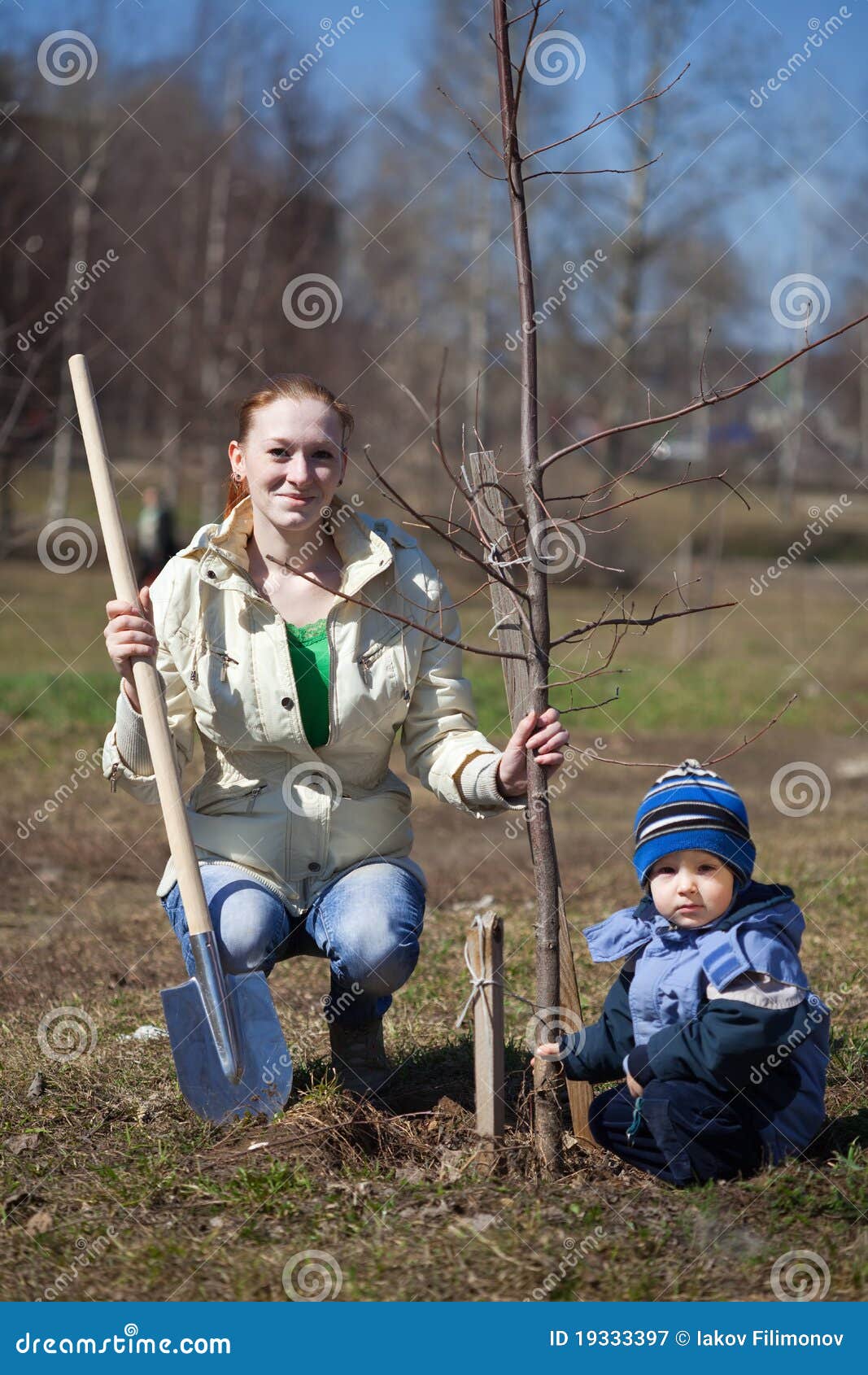 Mother and Son Planting Tree Stock Image - Image of rural, parent: 19333397