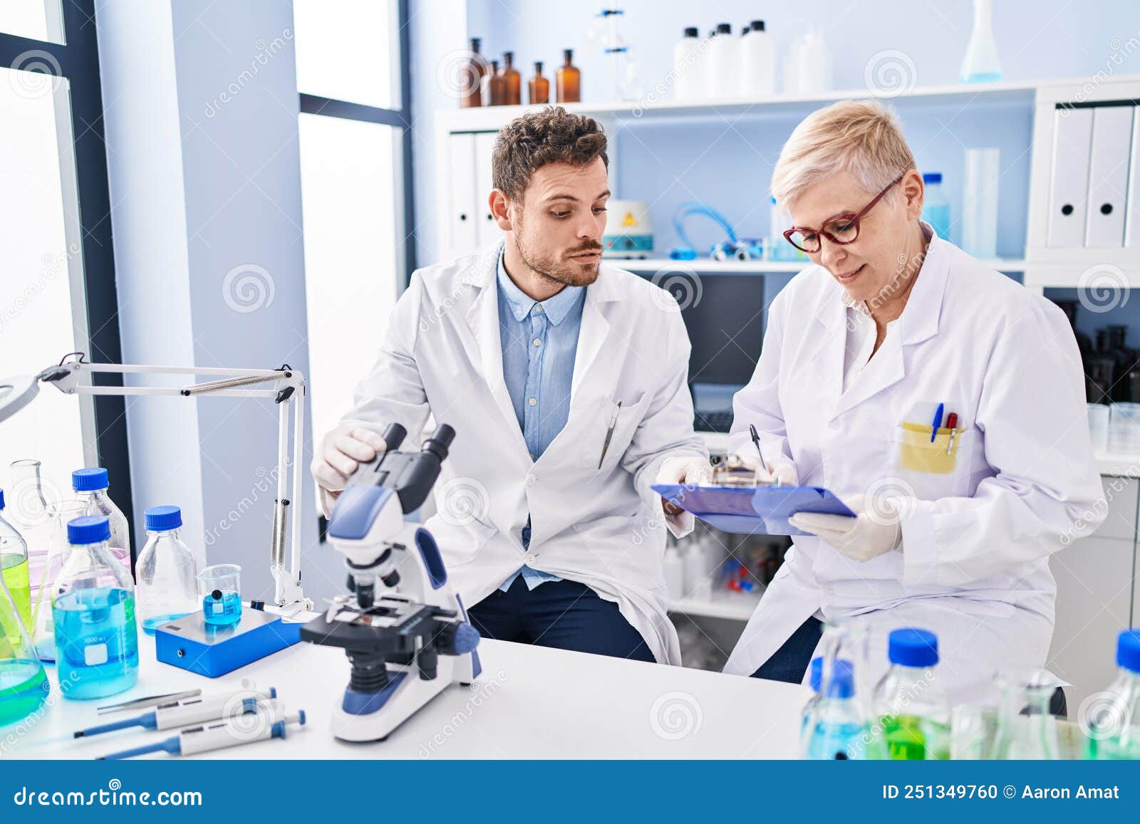Mother and Son Scientist Partners Working at Laboratory Stock Photo ...