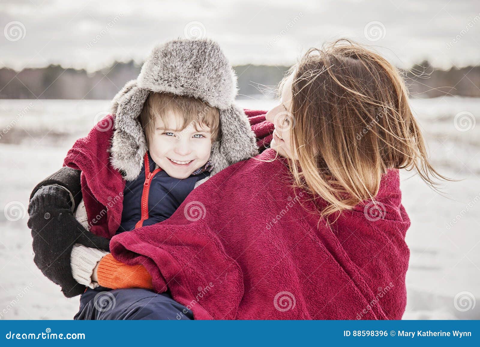 Mother and Son Snuggling Under Blanket Stock Photo - Image of holiday ...