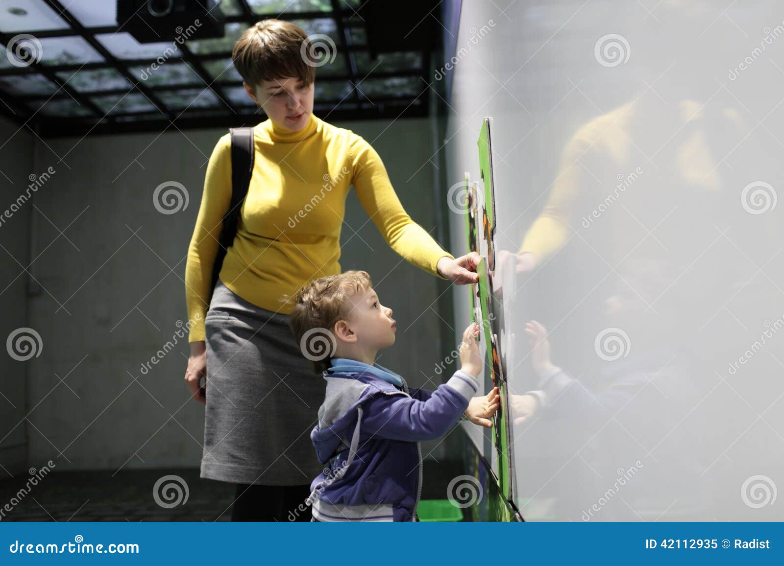 Mother with Son Solving Puzzles Stock Image - Image of challenge ...