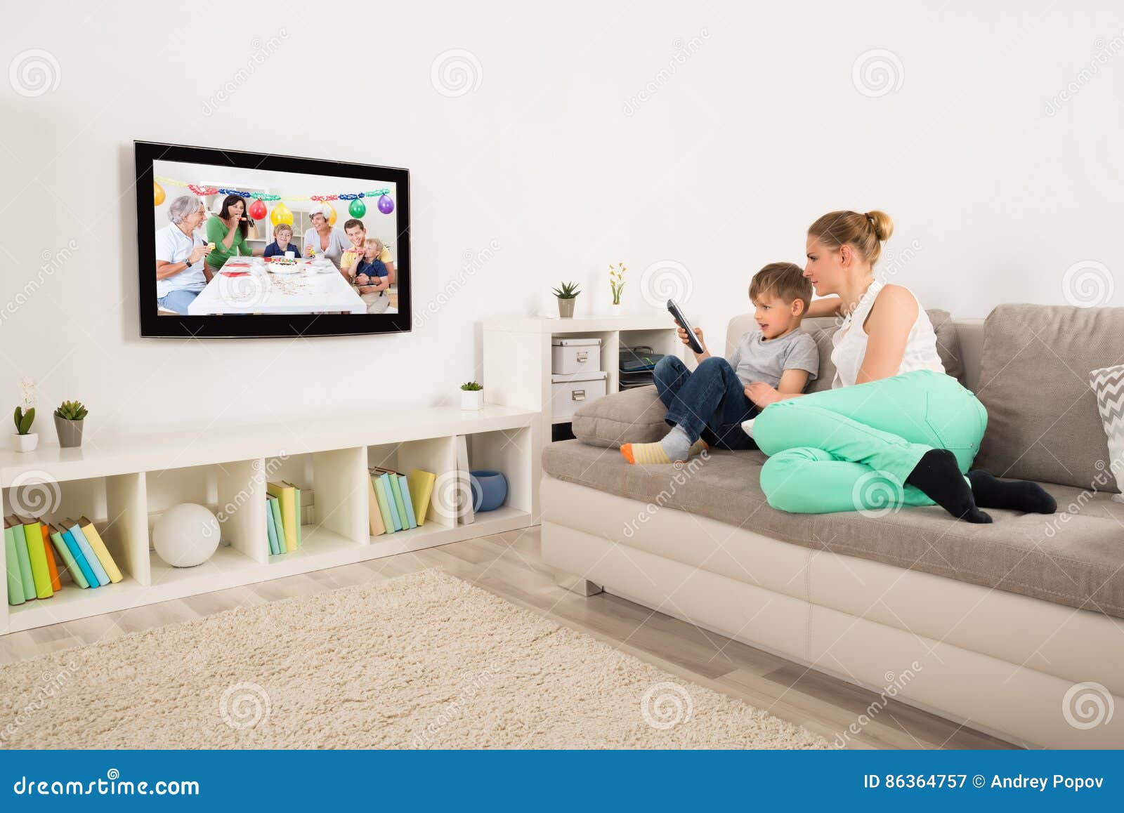 Mother And Son Watching Television At Home Stock Image Image Of