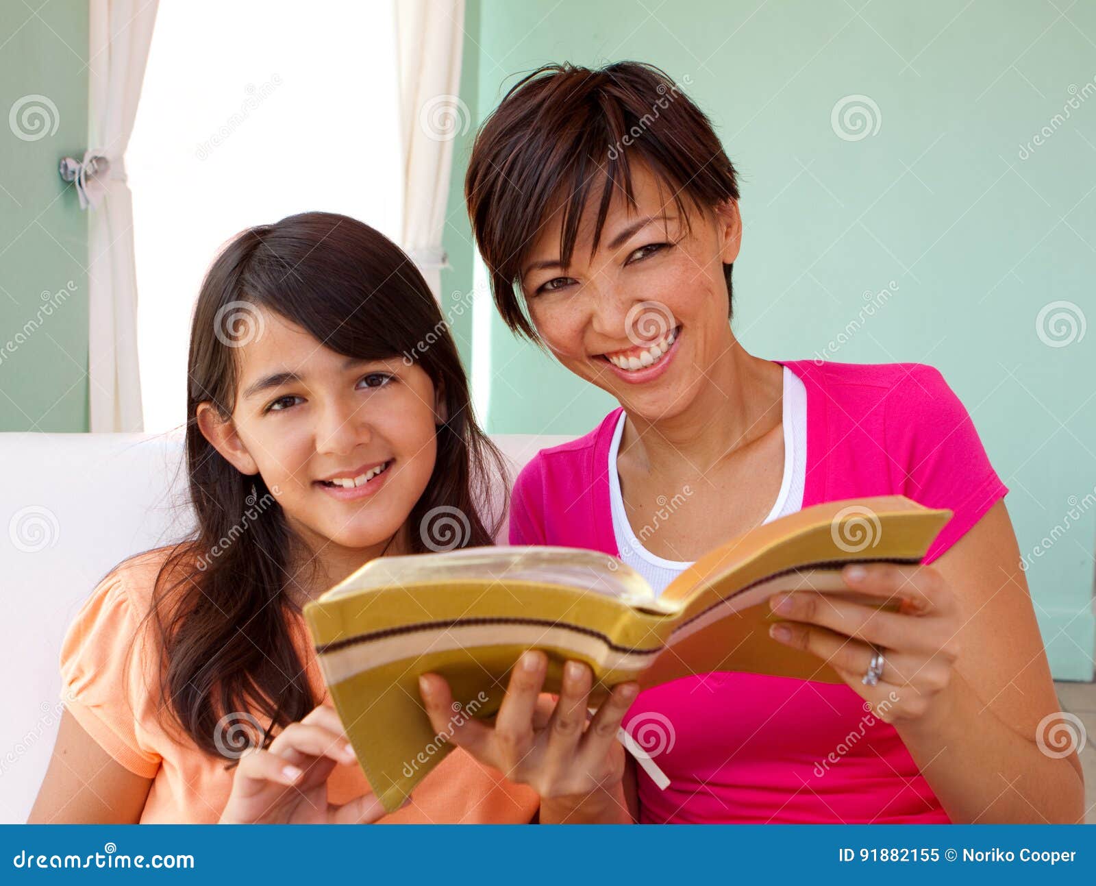 Mother Spending Time Reading with Her Daughters. Stock Image - Image of ...