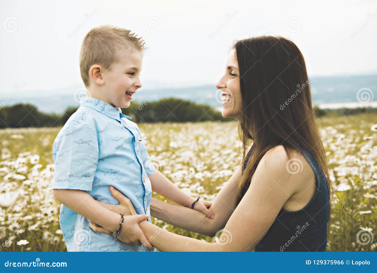 Mother Spending Time with Son during the Sunset. Stock Photo - Image of ...