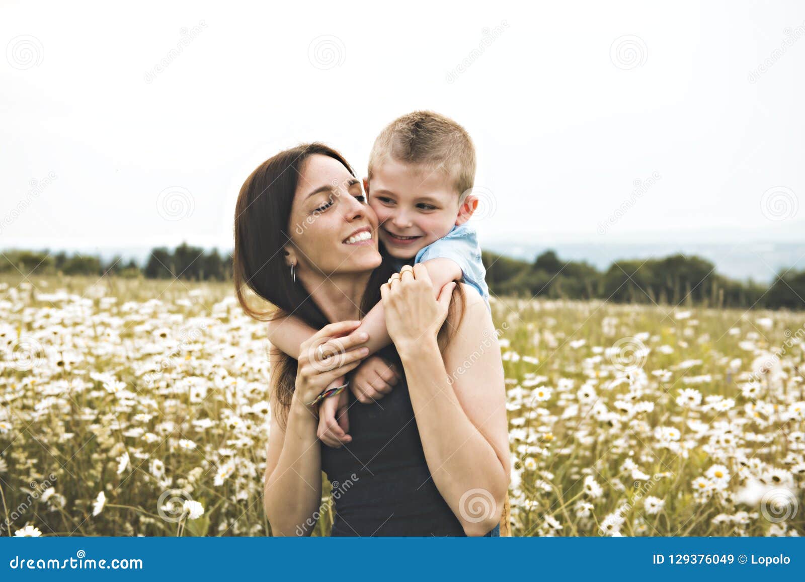 Mother Spending Time with Son during the Sunset. Stock Image - Image of ...