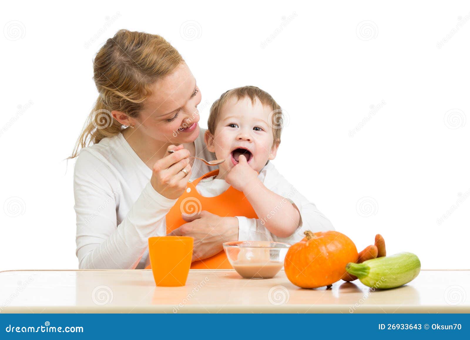 Mother Spoon Feeding Her Cute Baby Boy Stock Image - Image of happiness ...