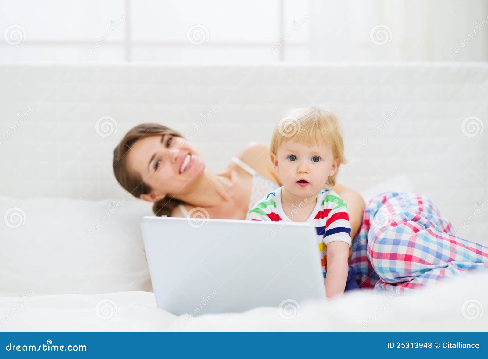 Mother and Surprised Baby Using Laptop Stock Photo - Image of indoors ...