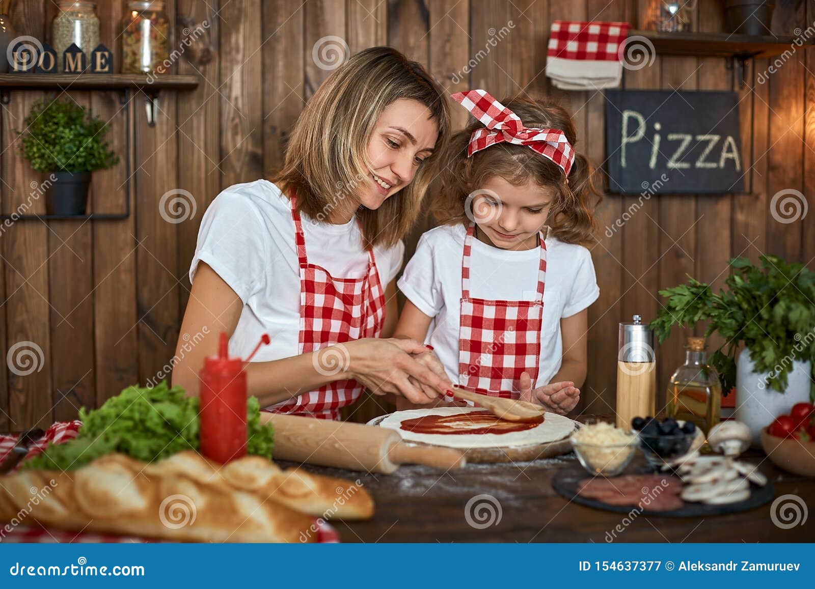 Mother Teaching Daughter Cooking Pizza And Smiling Stock Image Image