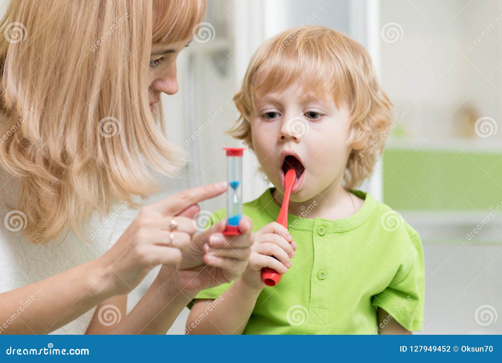 Mother Teaching and Helping Kid Son How To Brush His Teeth Stock Photo ... Mother Teaching and Helping Kid Son How To Brush His Teeth Stock Photo ...