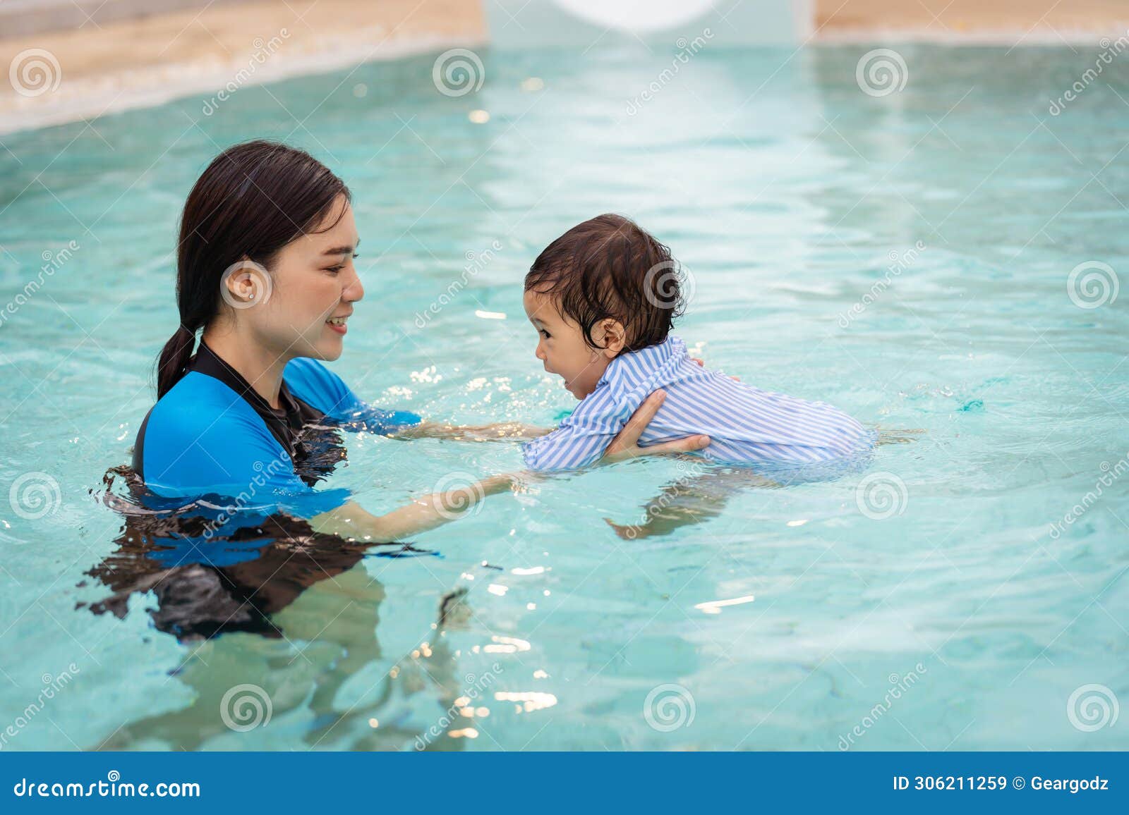 Mother Teaching Her Daughter Swimming in Pool Stock Image - Image of ... Mother Teaching Her Daughter Swimming in Pool Stock Image - Image of ...
