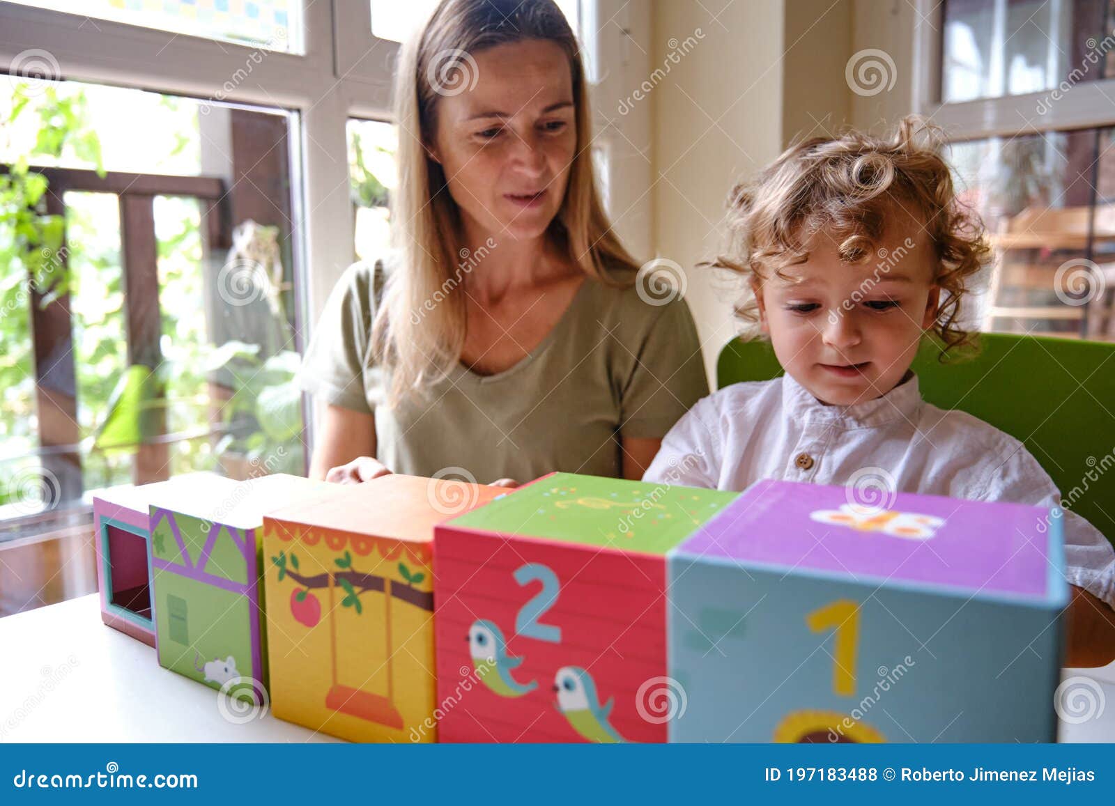Mother Teaching Numbers To Her Child. Stock Photo - Image of indoor ...