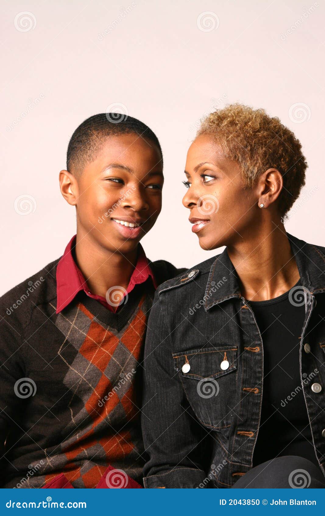 Mother and Teenage Boy stock photo. Image of smile, sweater - 2043850