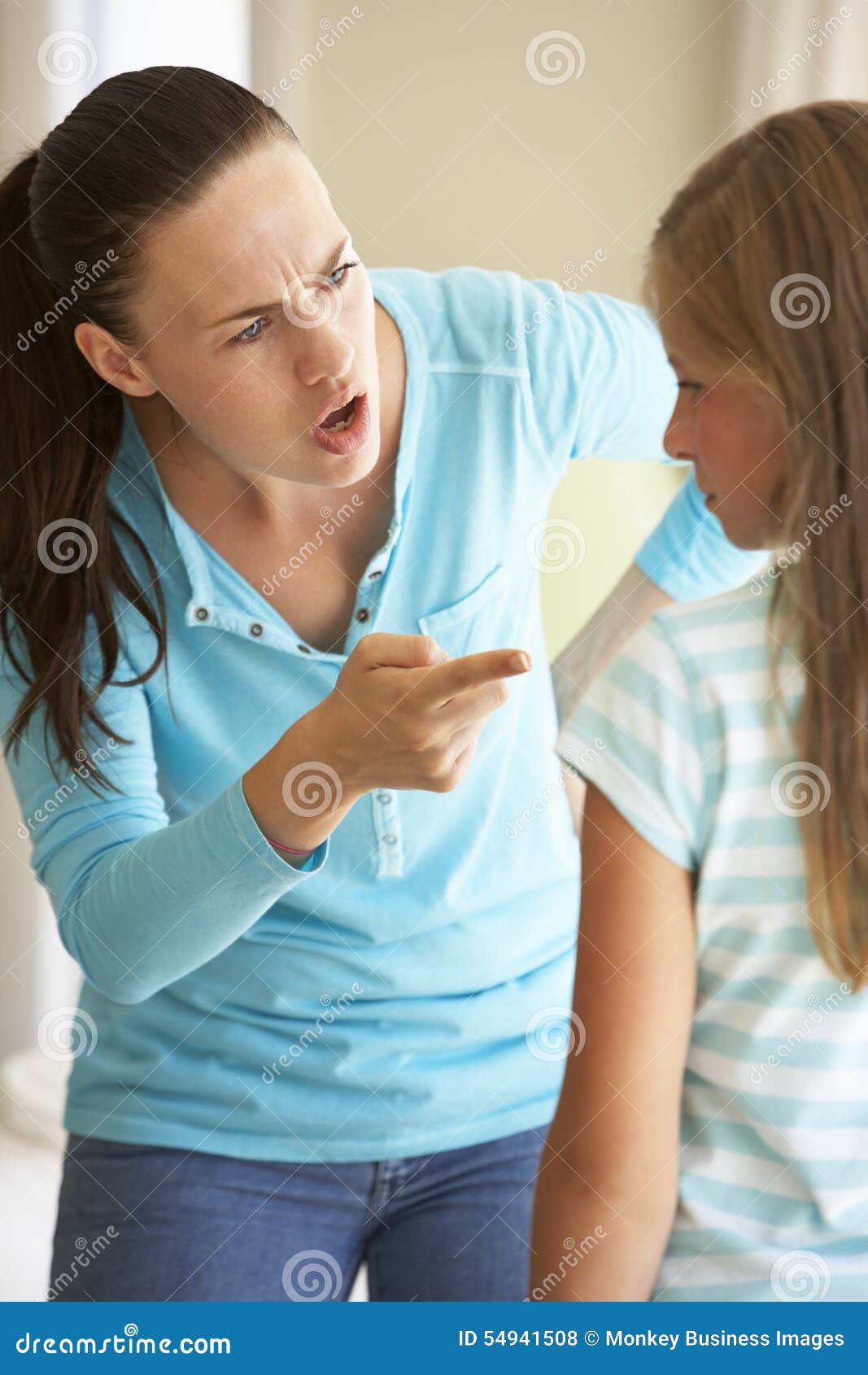 Mother Telling Off Daughter at Home Stock Photo - Image of mother ...