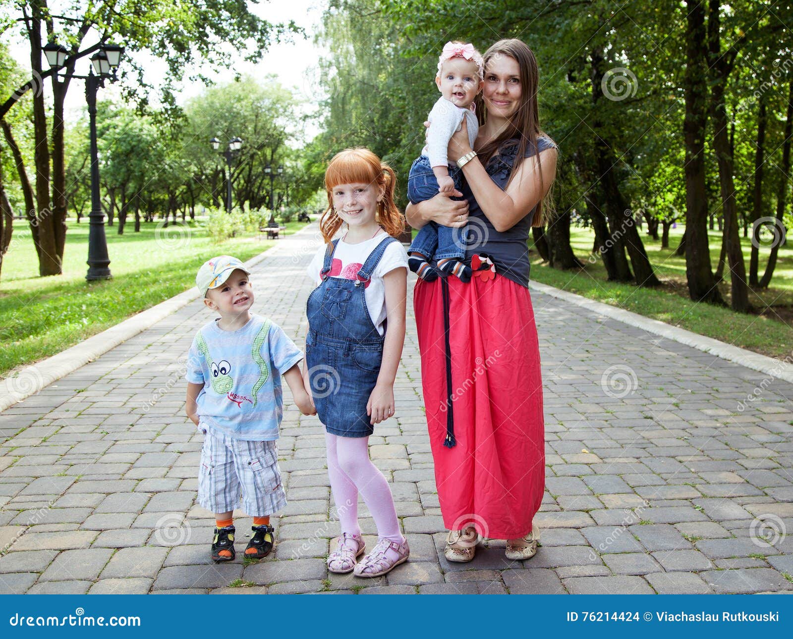 Mother with three children stock photo. Image of smile - 76214424