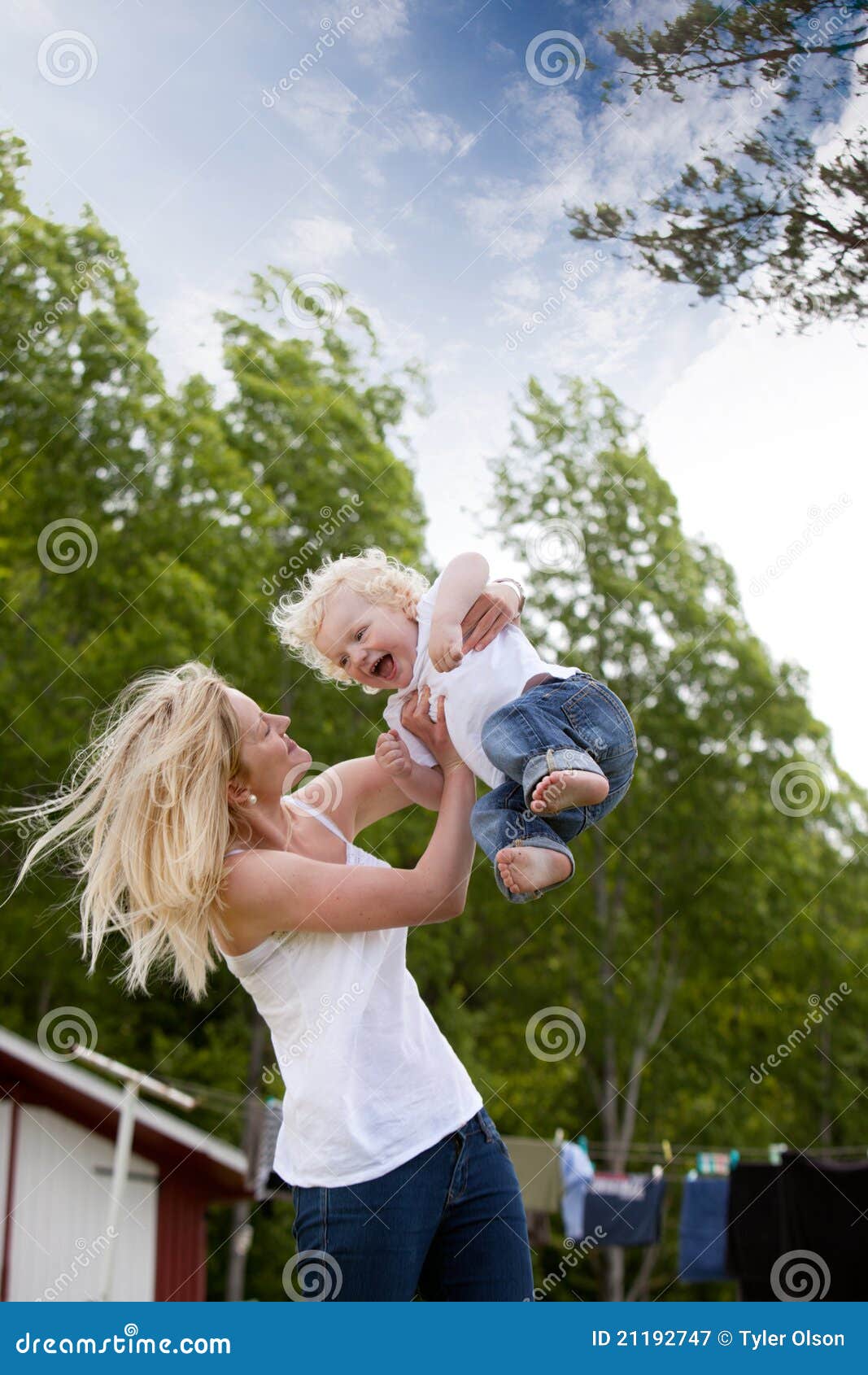 Mother Throwing Son in Air stock image. Image of norwegian - 21192747