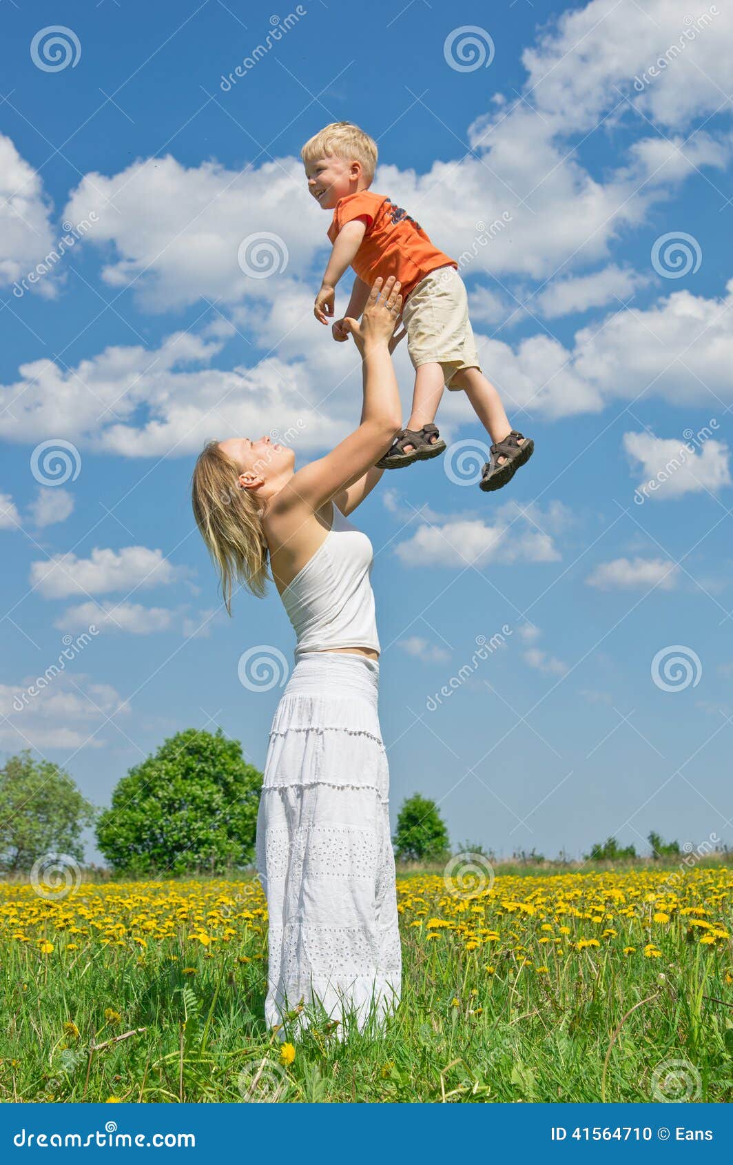 Mother Throwing Son into the Air Stock Photo - Image of outdoors ...