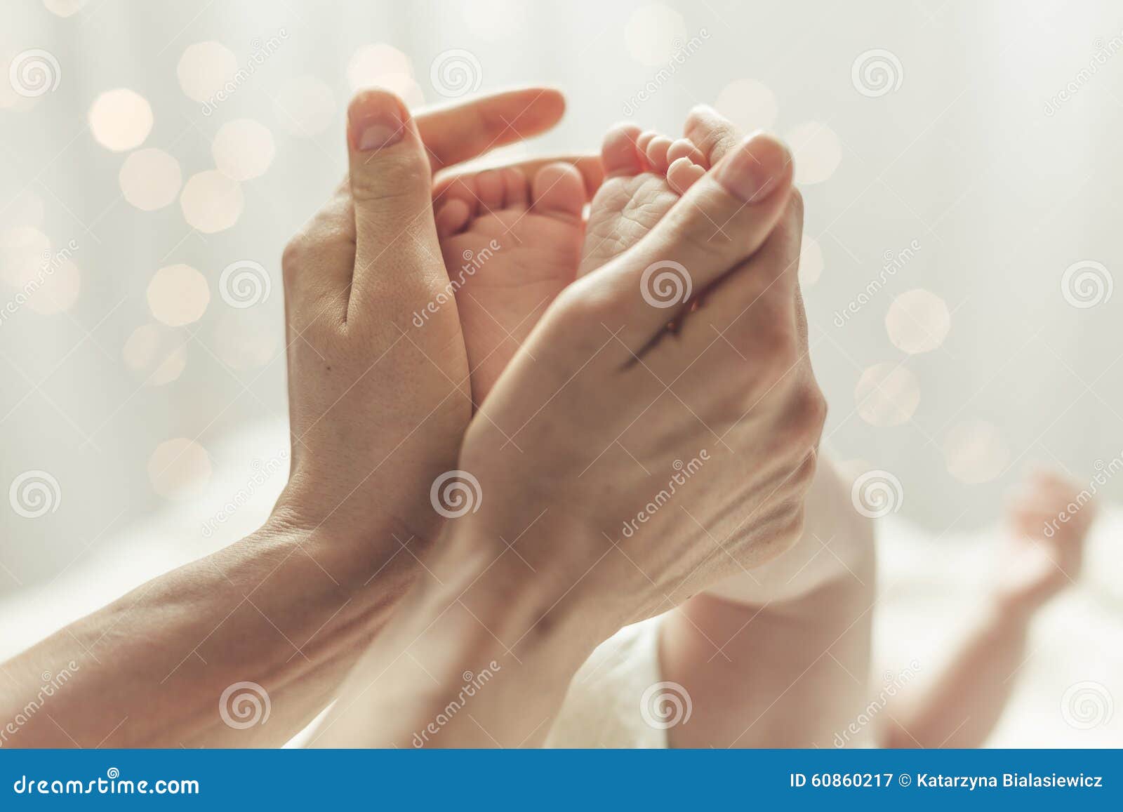 Mother Touching Feet of Newborn Stock Image - Image of security, touch ...