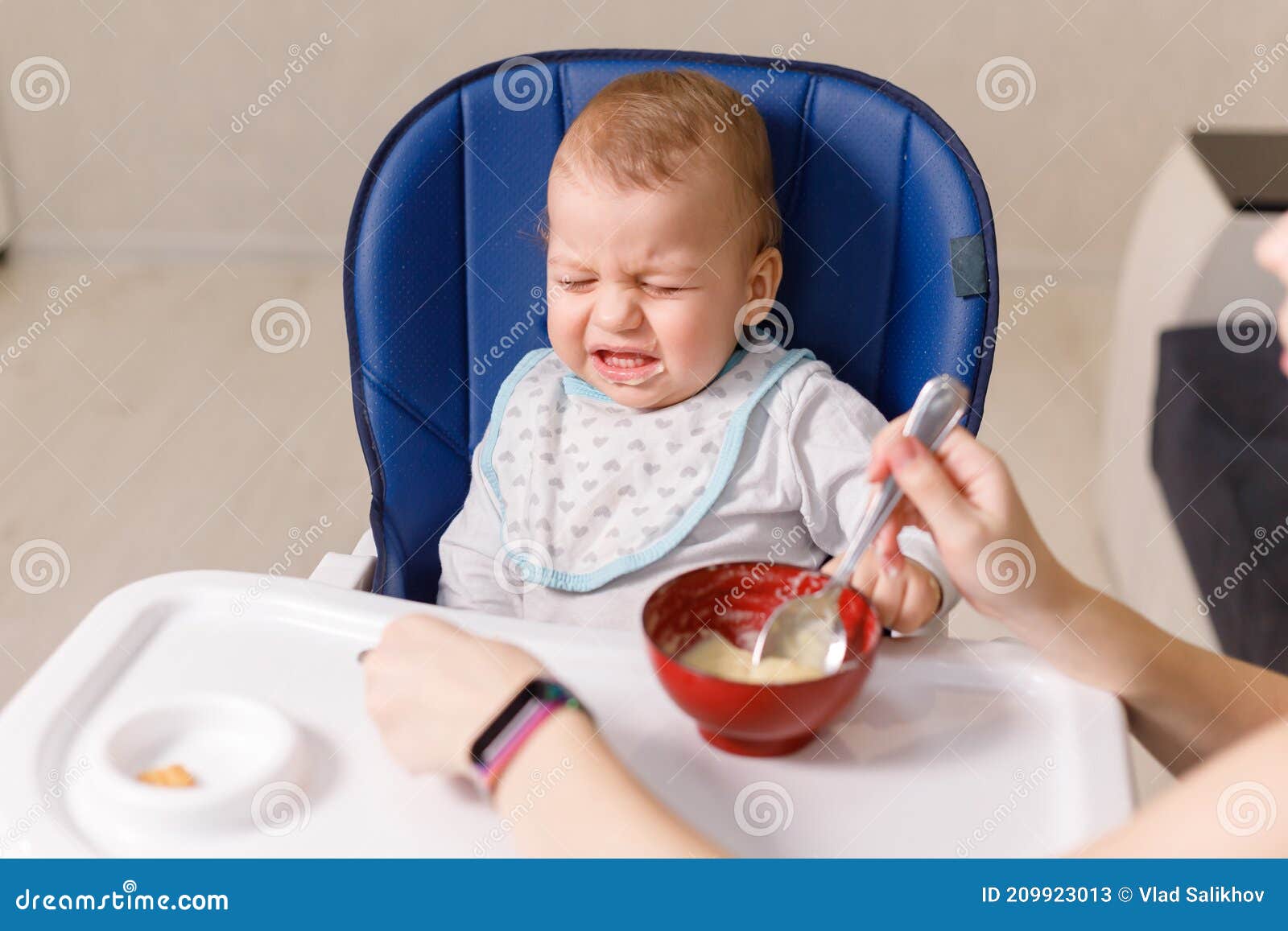 Mother Tries To Feed with Spoon Naughty Infant Kid Refusing Eating ...