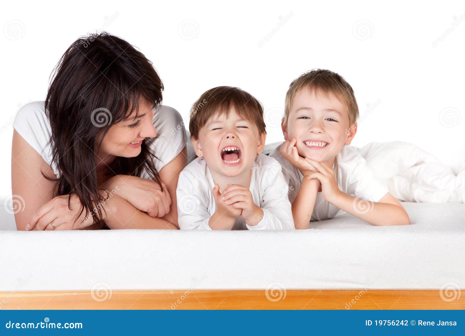 Mother with two children stock photo. Image of grinning - 19756242