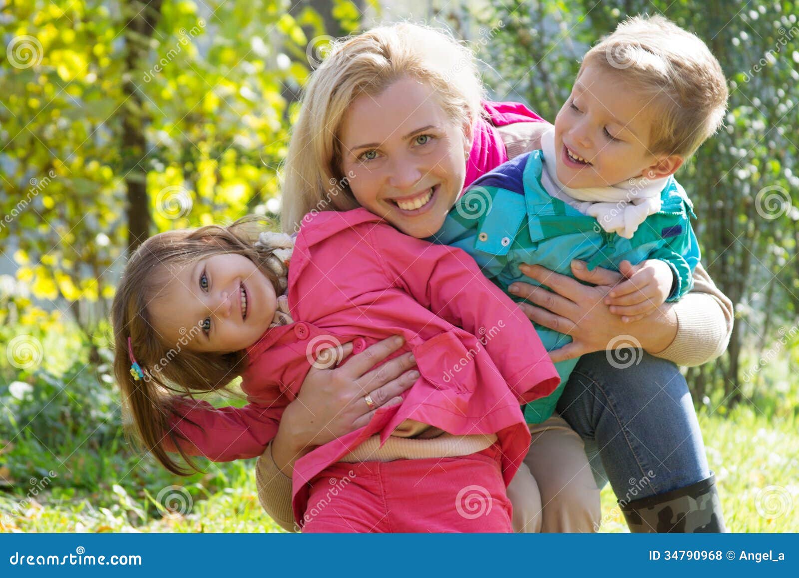 Mother and Two Children in Autumn Park Stock Photo - Image of grass ...
