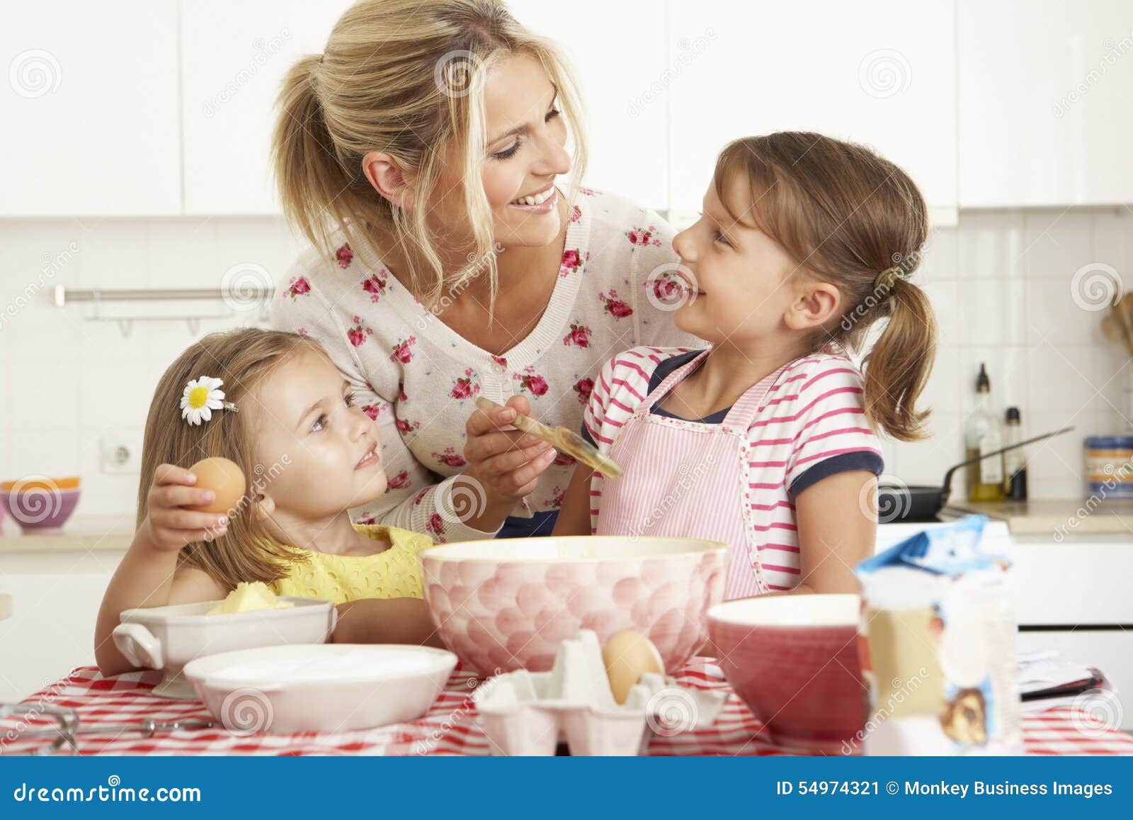 Mother and Two Girls Baking in Kitchen Stock Image - Image of kitchen ...