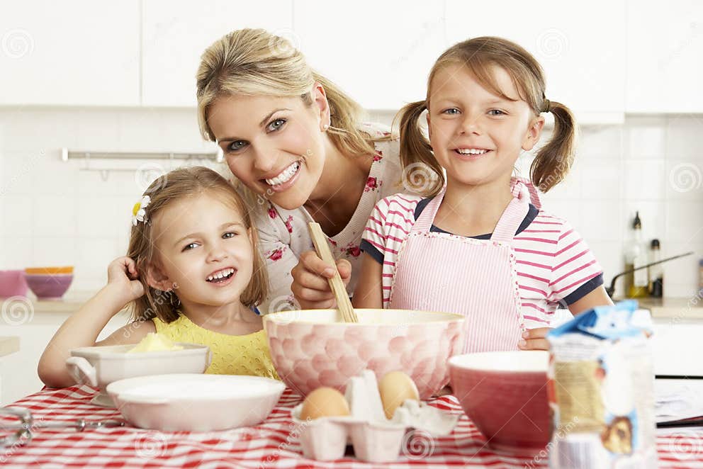 Mother and Two Girls Baking in Kitchen Stock Photo - Image of homemade ...