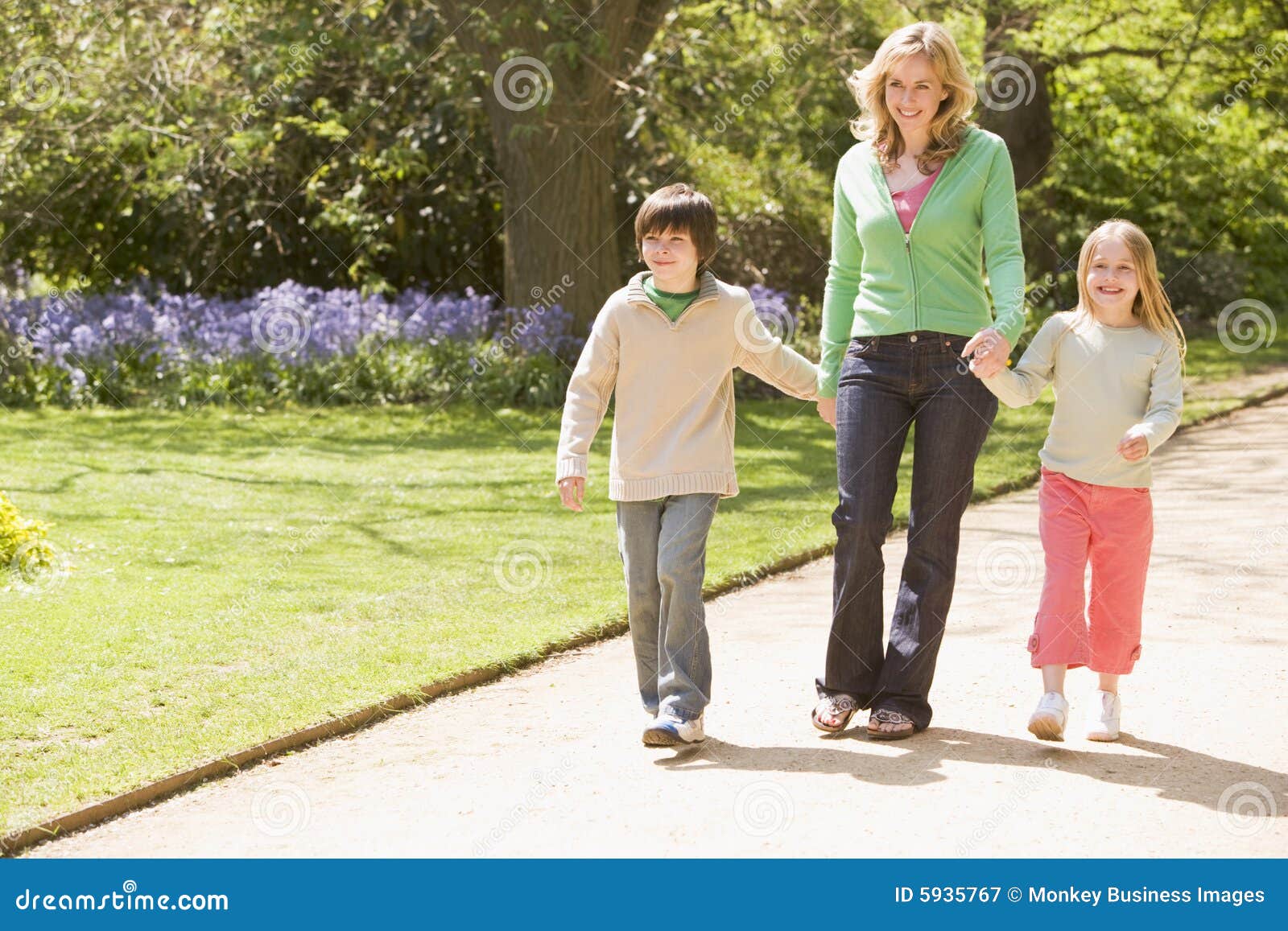 Mother and Two Young Children Walking on Path Stock Image - Image of ...