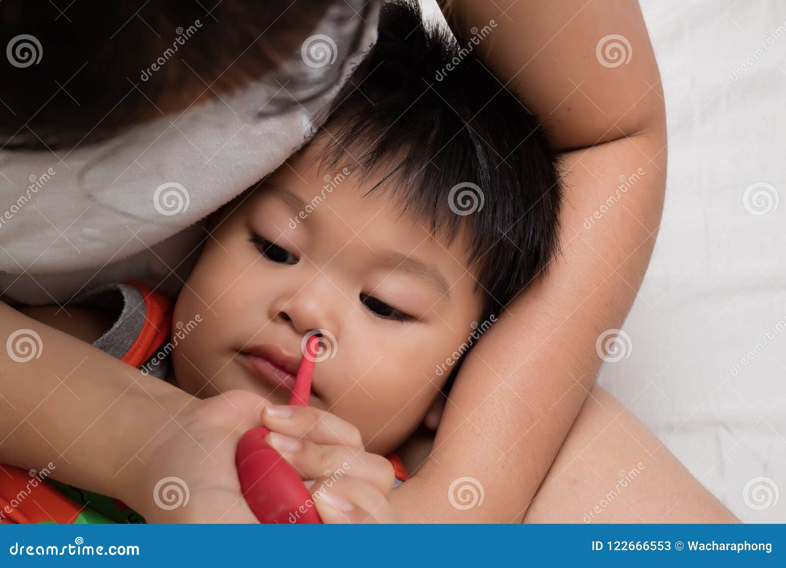 Mother Using a Mucus Suction Stock Image - Image of nose, background ...