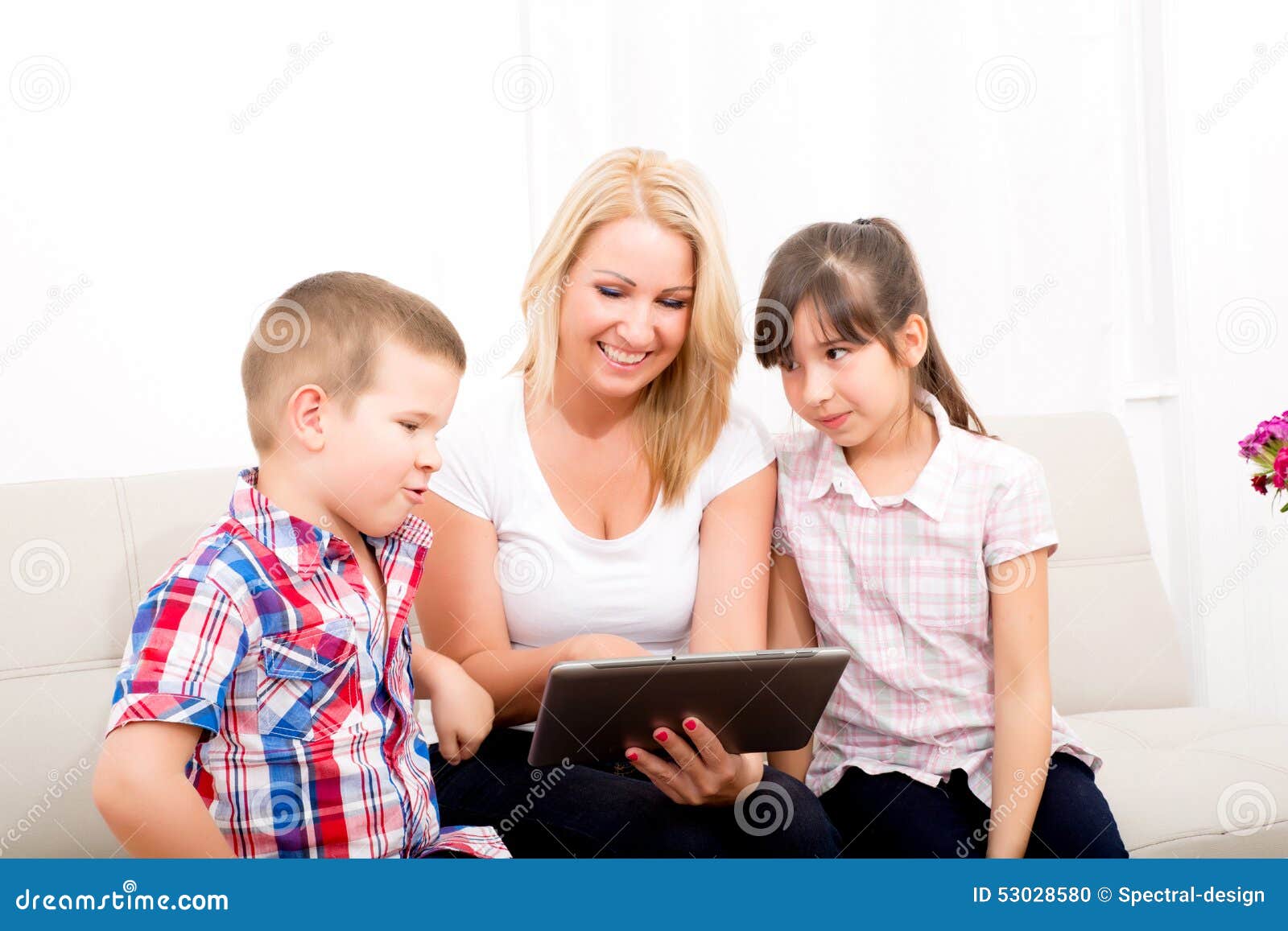 Mother using a Tablet PC stock photo. Image of education - 53028580