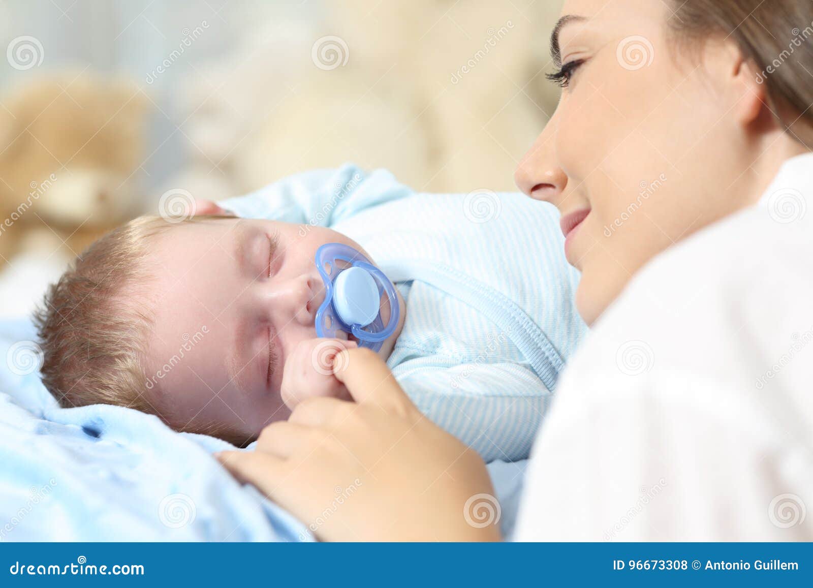 Mother Watching Her Baby Sleeping on Bed Stock Photo - Image of ...