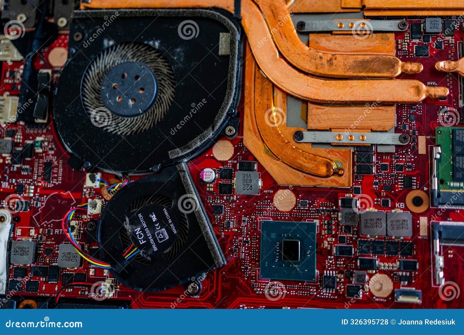 A Motherboard with Intricate Circuit Patterns, RAM Modules, and Various ...