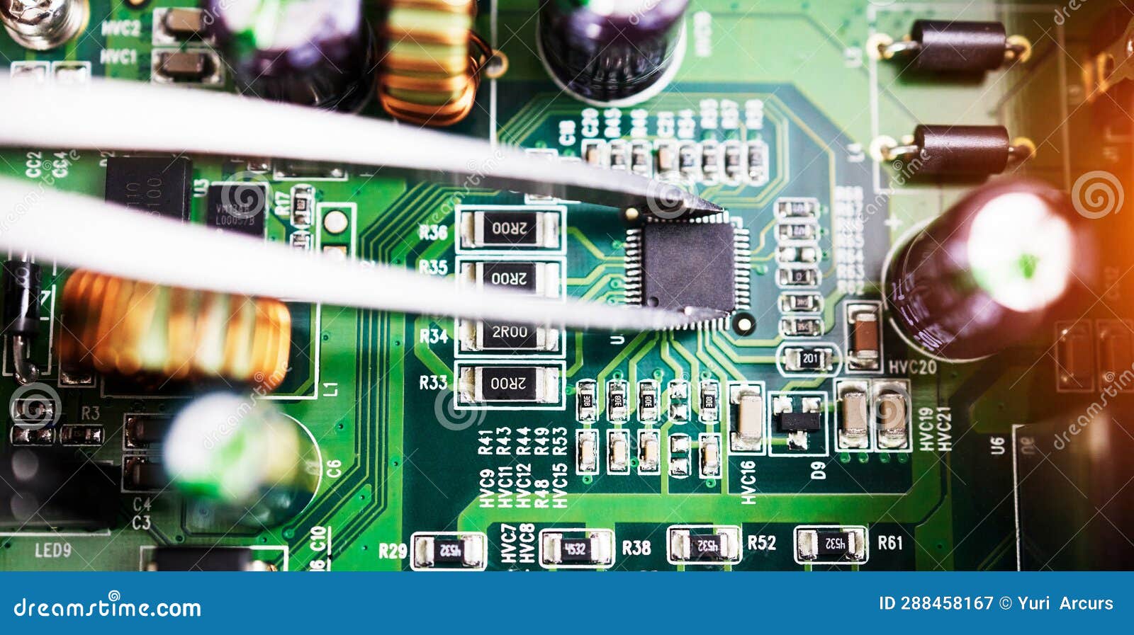 Motherboard, Microchip Closeup and Engineering Tweezer with Electric ...
