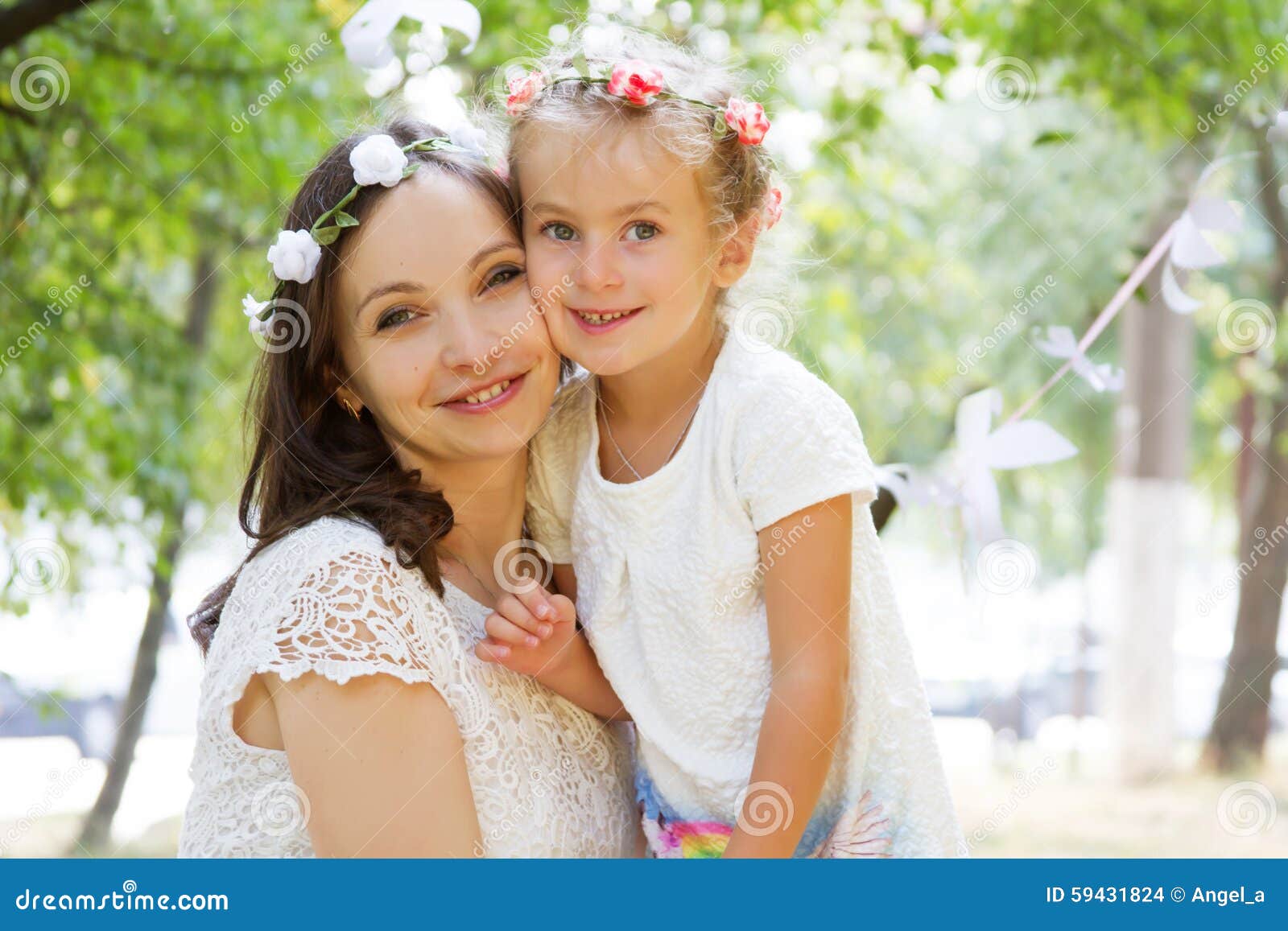 Mothre and Daughter Cheek To Cheek Stock Photo - Image of relaxed ...