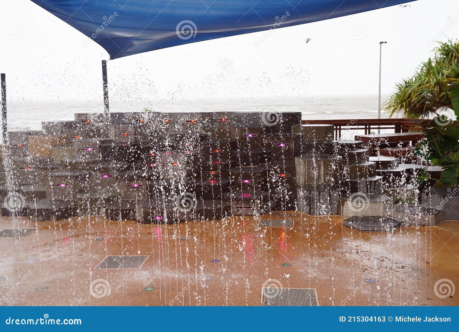 Motion Activated Water Sprays by the Sea Stock Image - Image of light ...