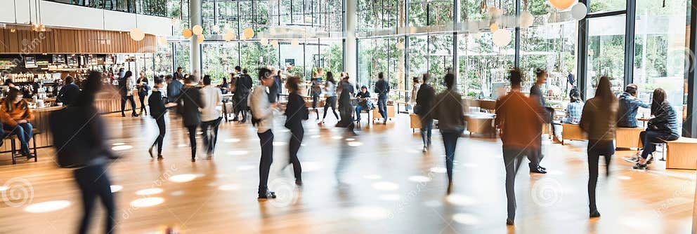 Motion Blur of Busy Crowd of People, Workers, and Commuters Inside a ...