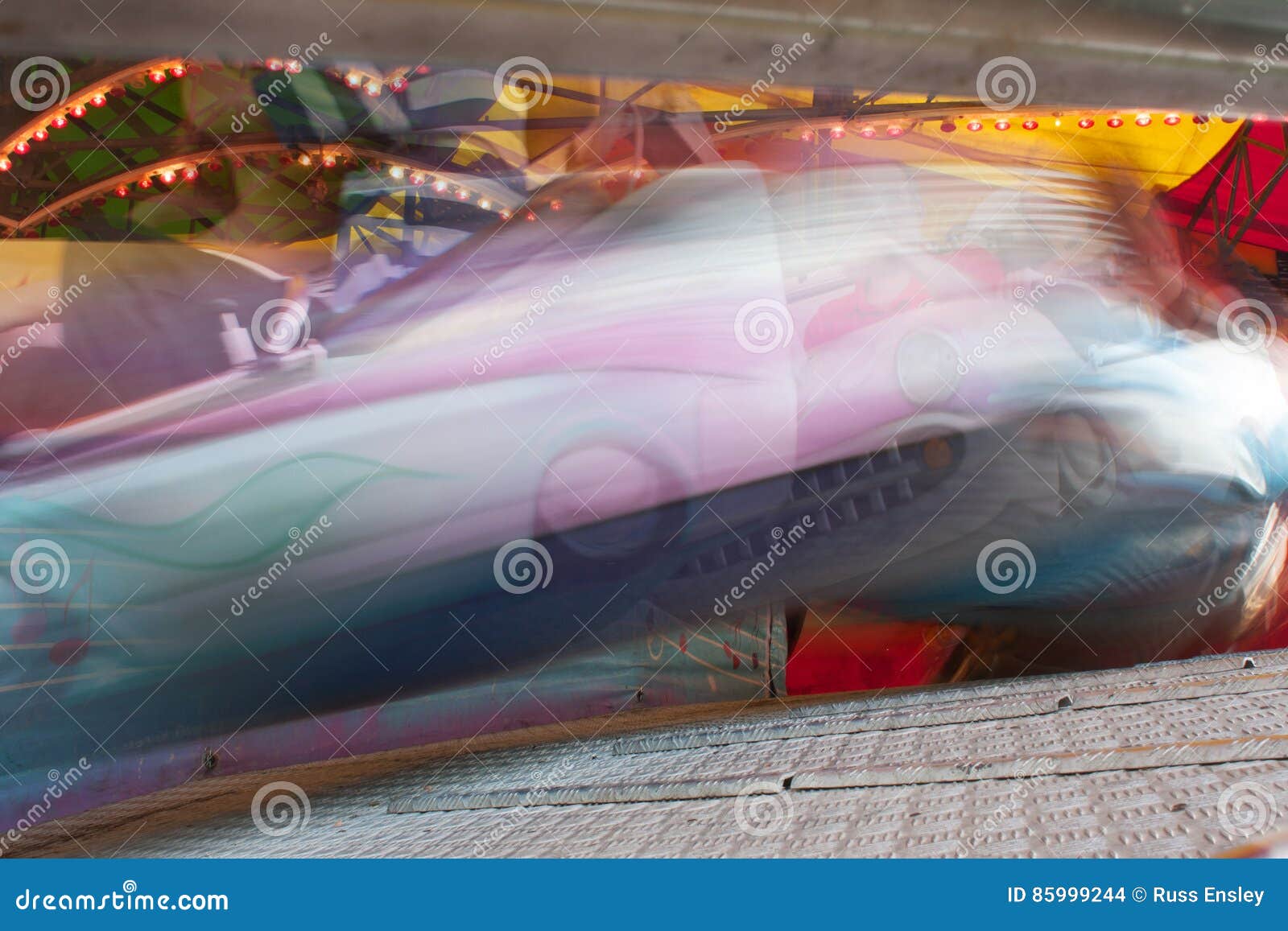 Motion Blur of People Riding Fast Carnival Ride Editorial Stock Image ...