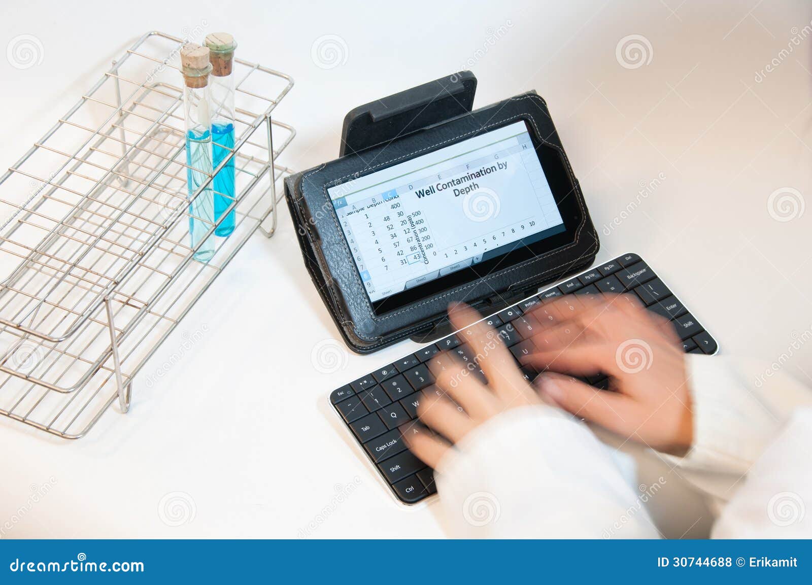 Motion Blur Typing in a Laboratory Stock Photo - Image of blue, worker ...