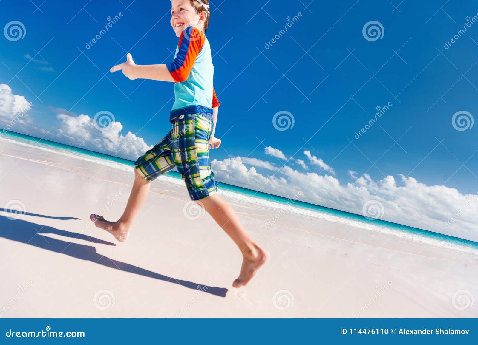 Motion Blurred Boy Running Fast Stock Photo - Image of coastline ...