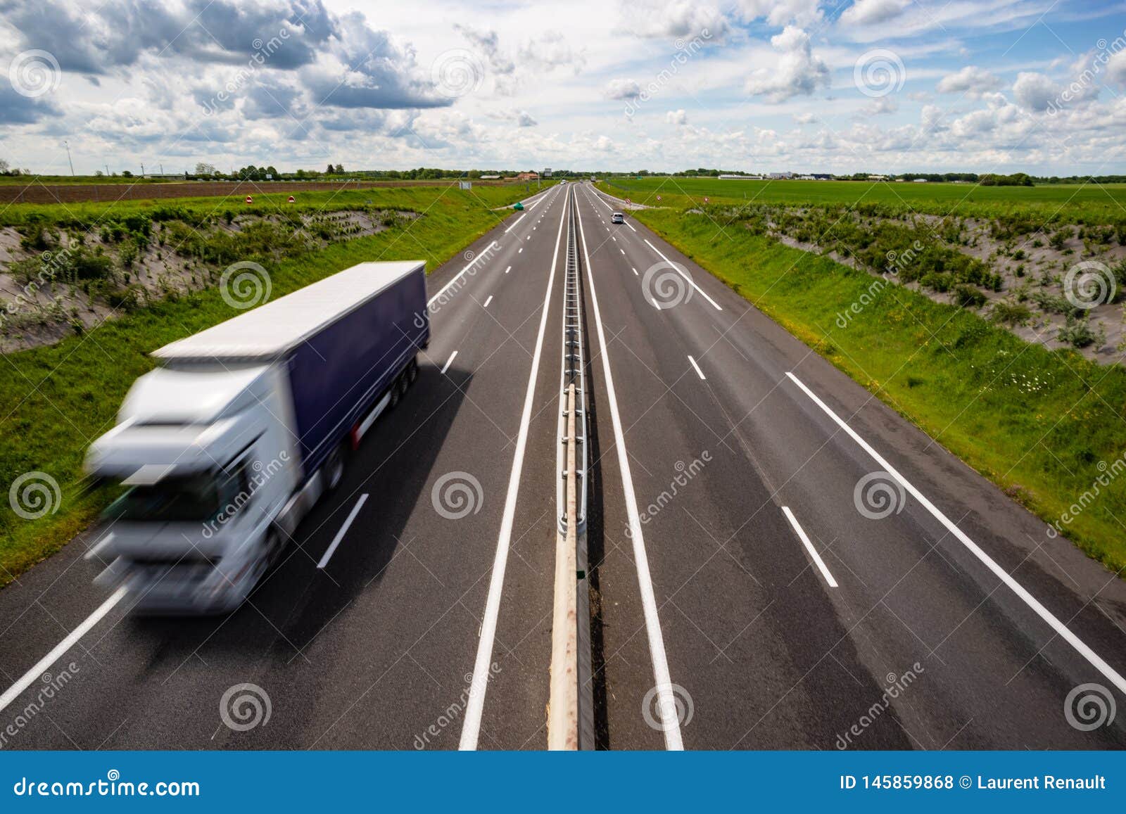 Motion Blurred Truck on the Highway Stock Photo - Image of delivering ...