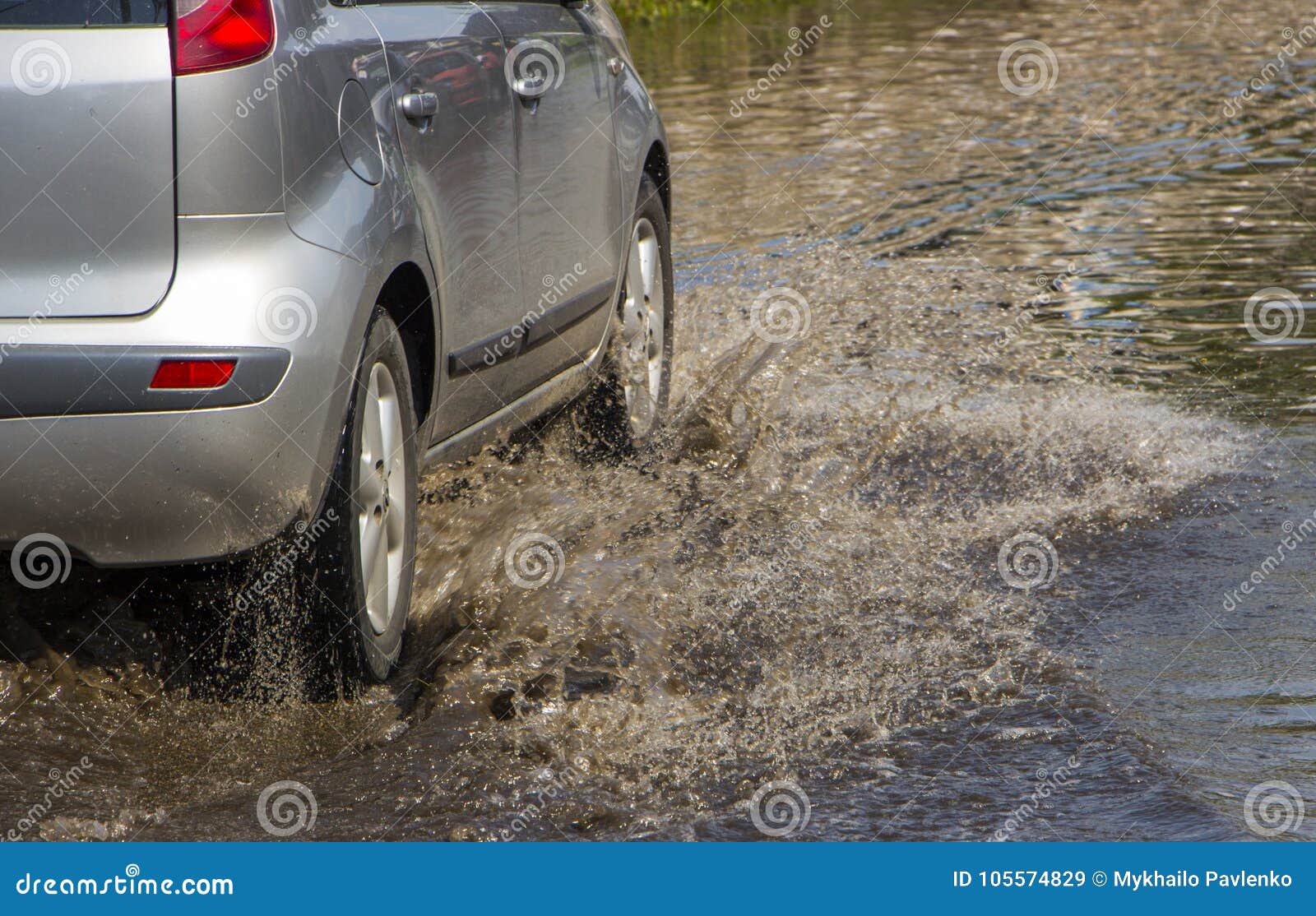 Motion Car Rain Big Puddle of Water Spray from the Wheels Stock Image ...