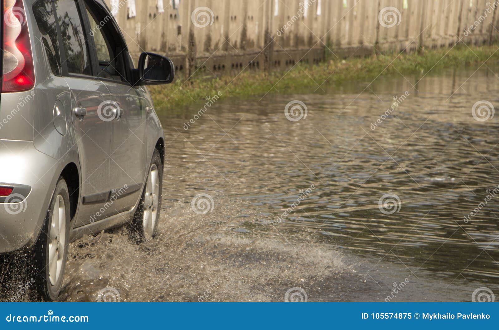Motion Car Rain Big Puddle of Water Spray from the Wheels Stock Image ...