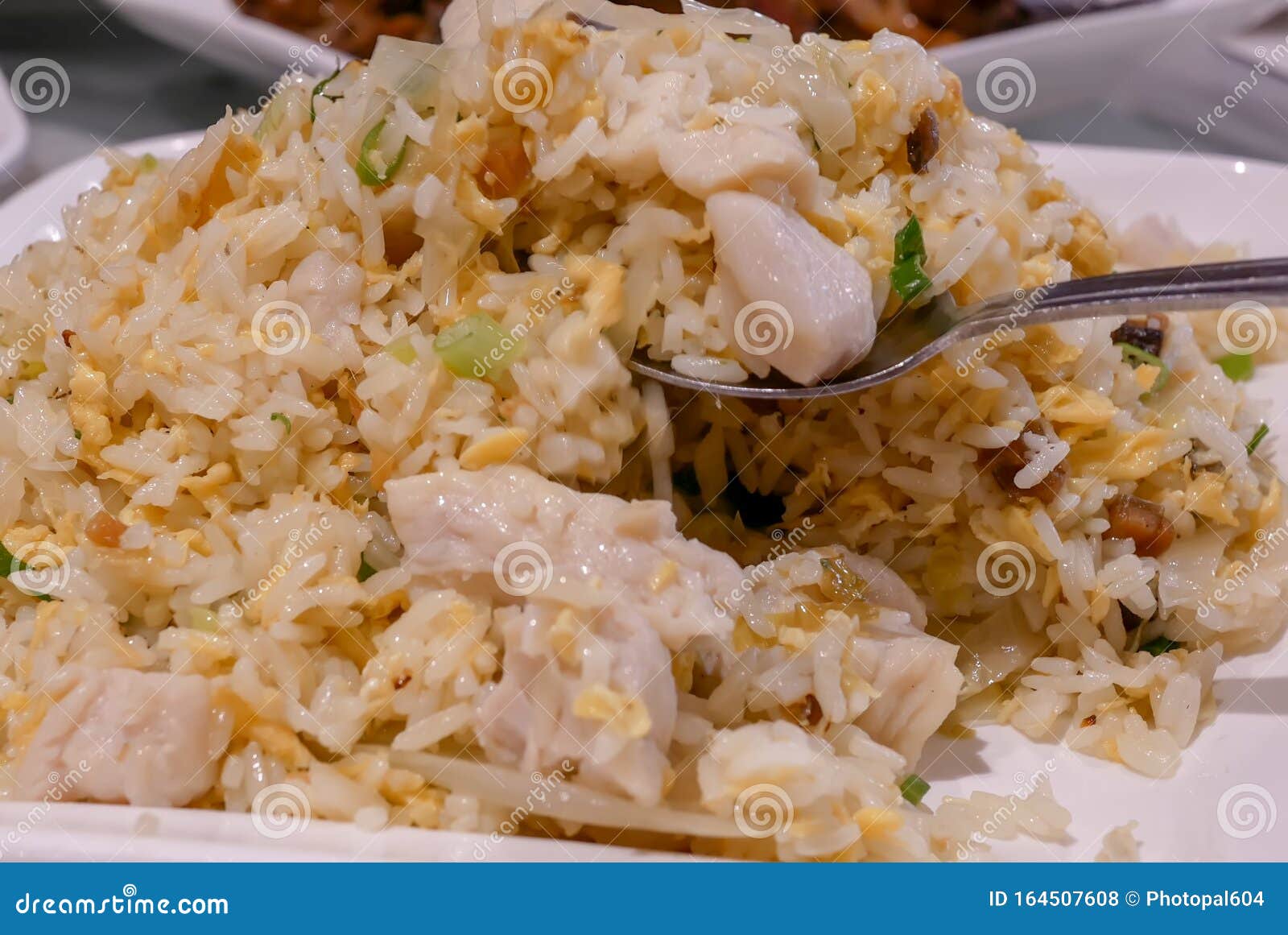 Motion of People Eating Fried Rice on Table Inside Restaurant Stock ...