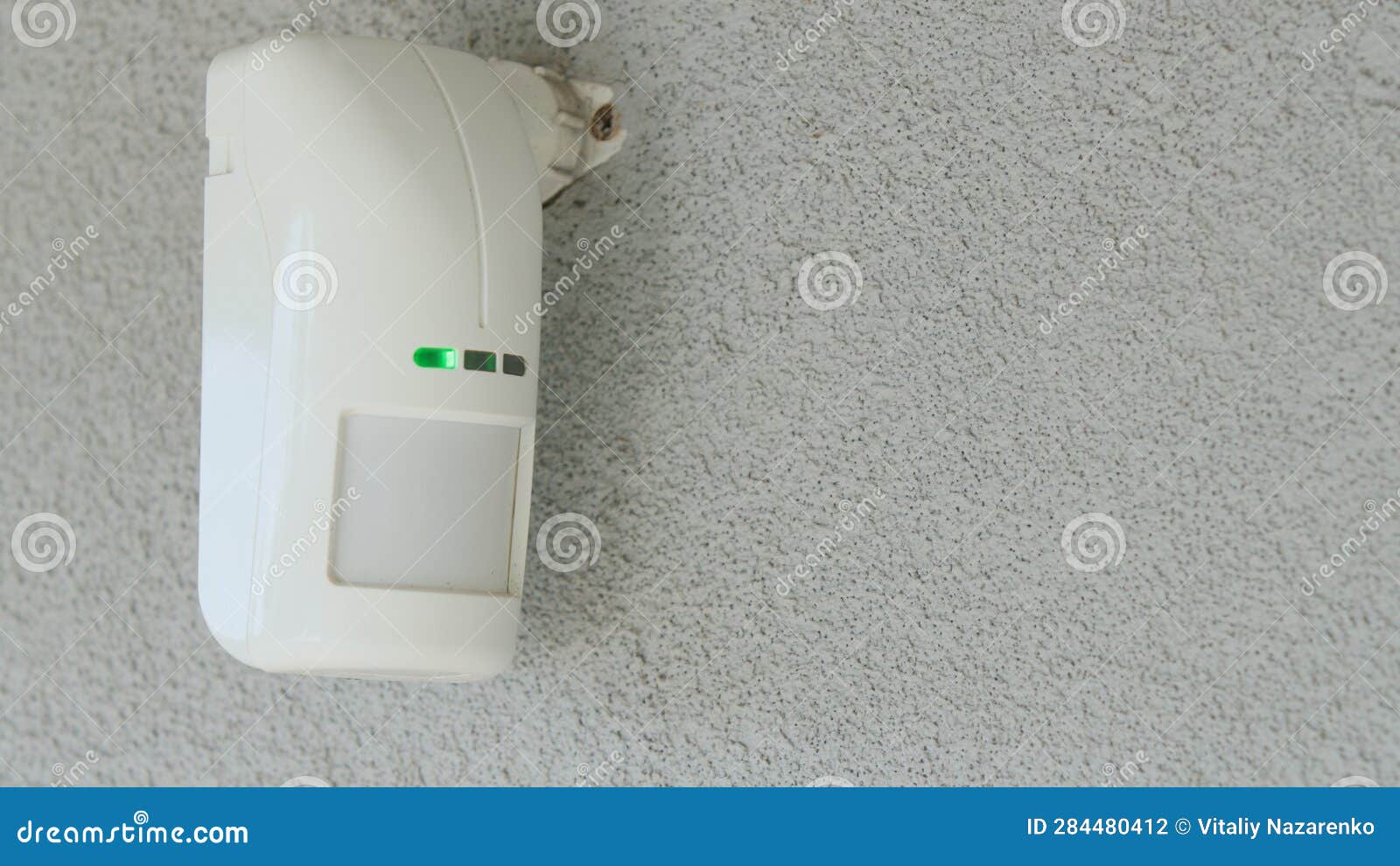 Motion Sensor on the Wall of the House. LED Indicators Light Up To ...