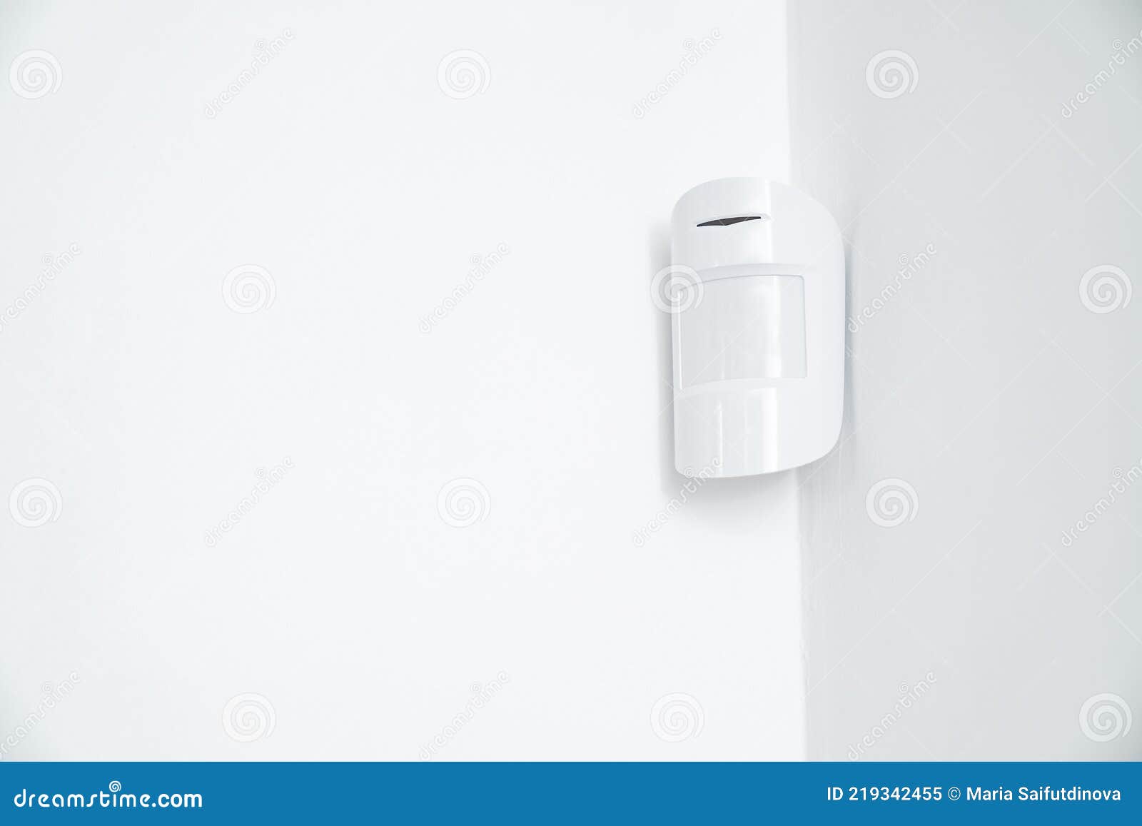Motion Sensor in the White Corner. Device that Tracks Movement of ...